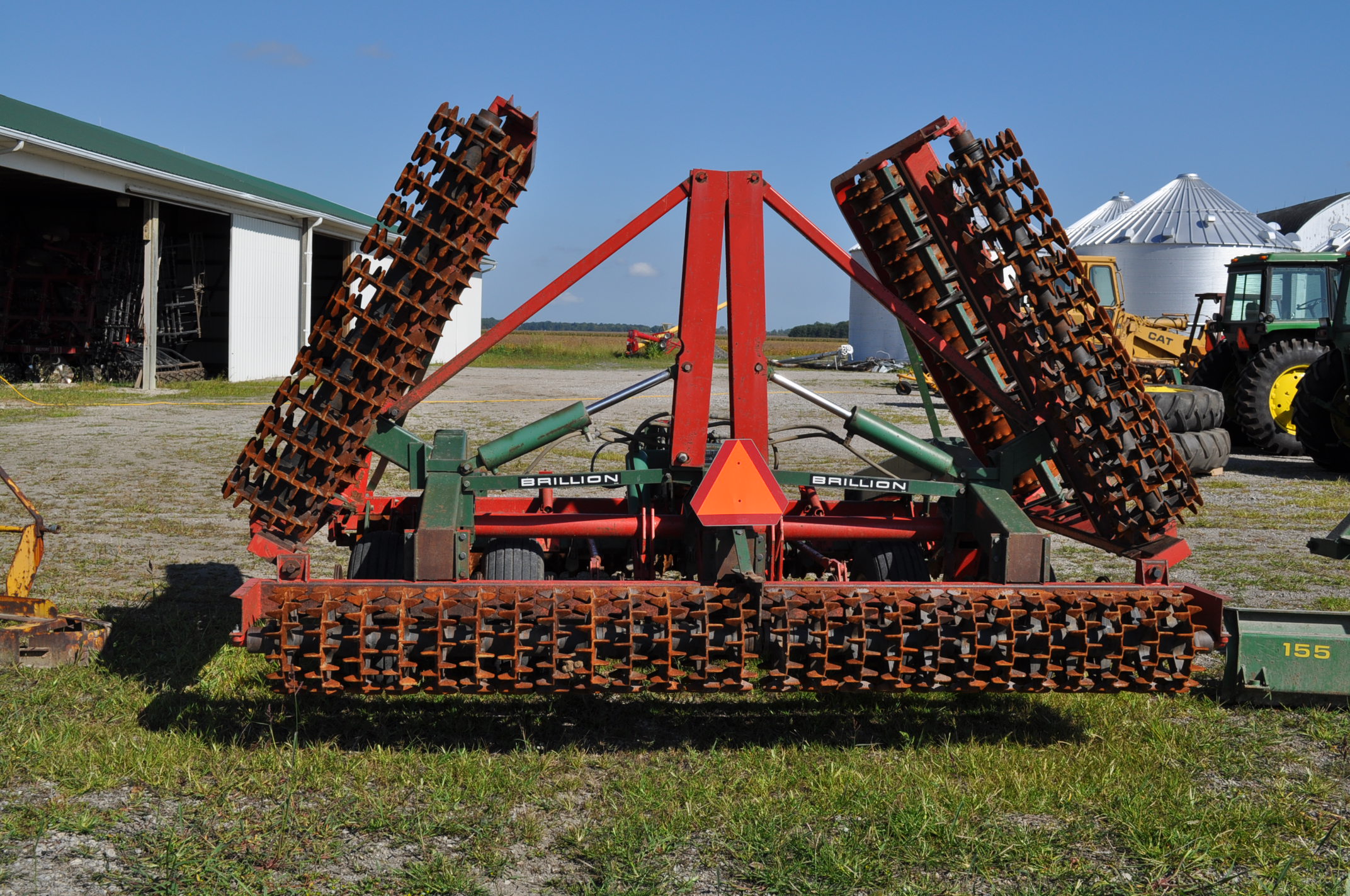 24’ Brillion cultimulcher, solid front wheels, s tines, rear crows foot ...