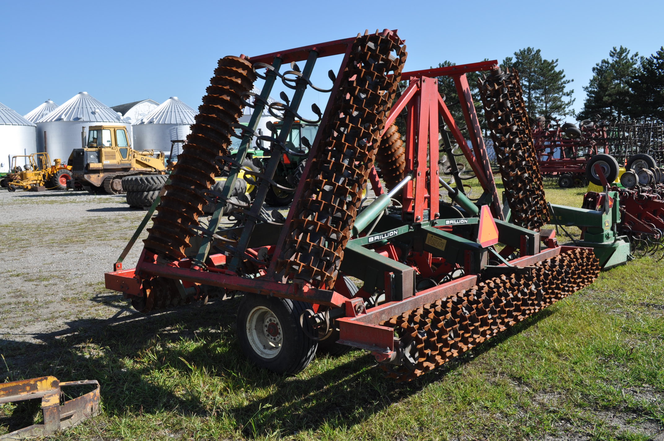 24’ Brillion cultimulcher, solid front wheels, s tines, rear crows foot ...
