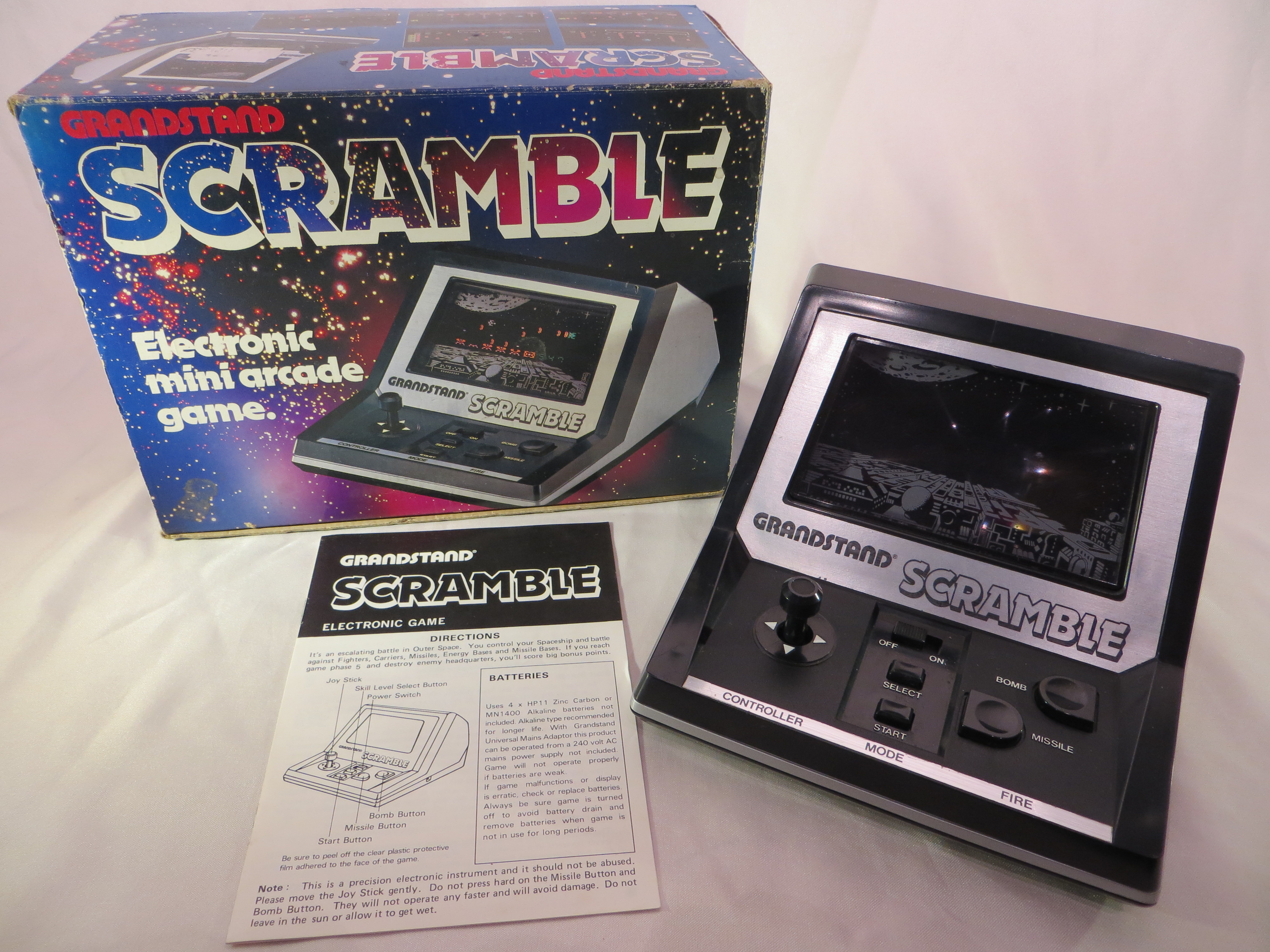 An original Grandstand Scramble electronic game. Working, boxed, with ...