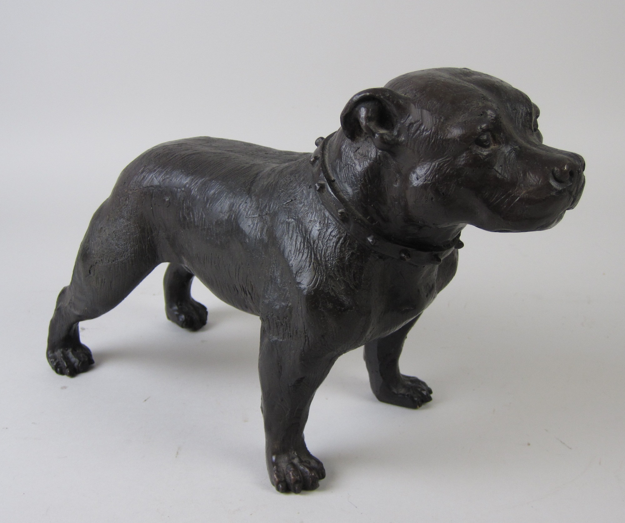 A cast metal Model of a Staffordshire Bull Terrier, 8in