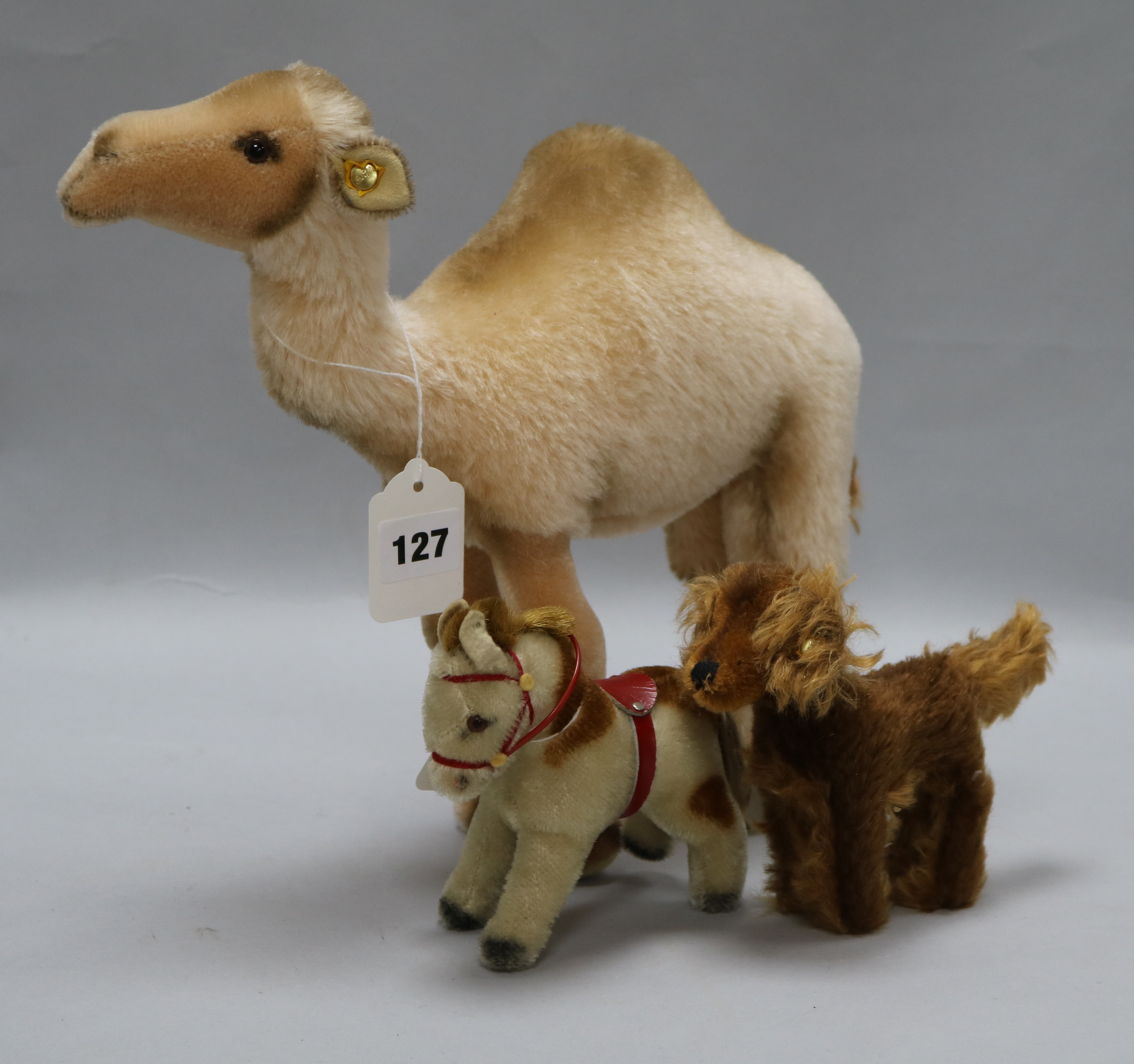 A Steiff camel, a Steiff 1960's miniature pony and an Irish Setter, all ...