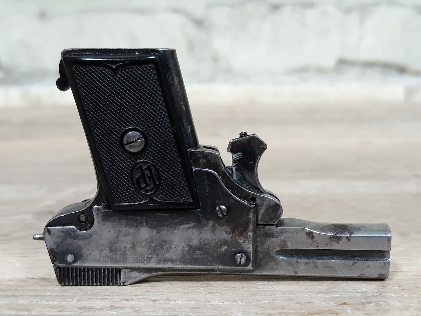 A Kolibri 2.7mm miniature semi automatic pistol.