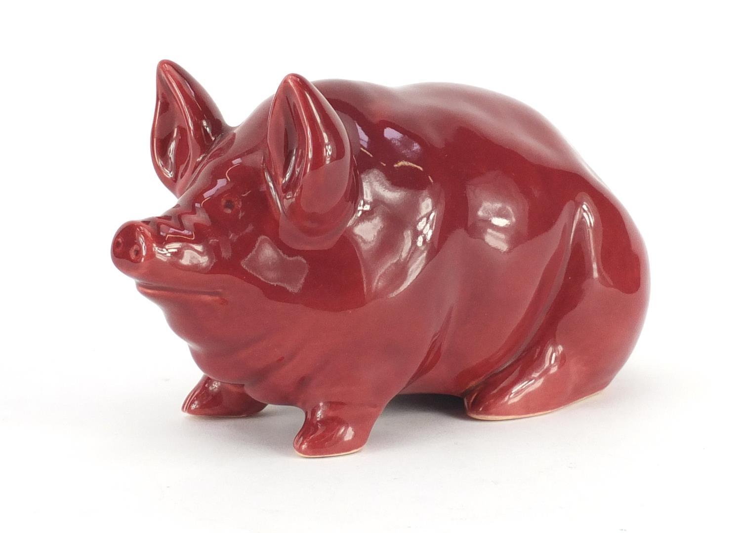 Wemyss Ware pink glazed pottery pig, impressed marks to the base, 18cm ...