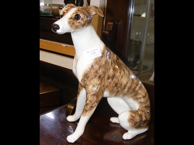 A Winstanley pottery Greyhound with glass eyes - 32cm high CONDITION ...