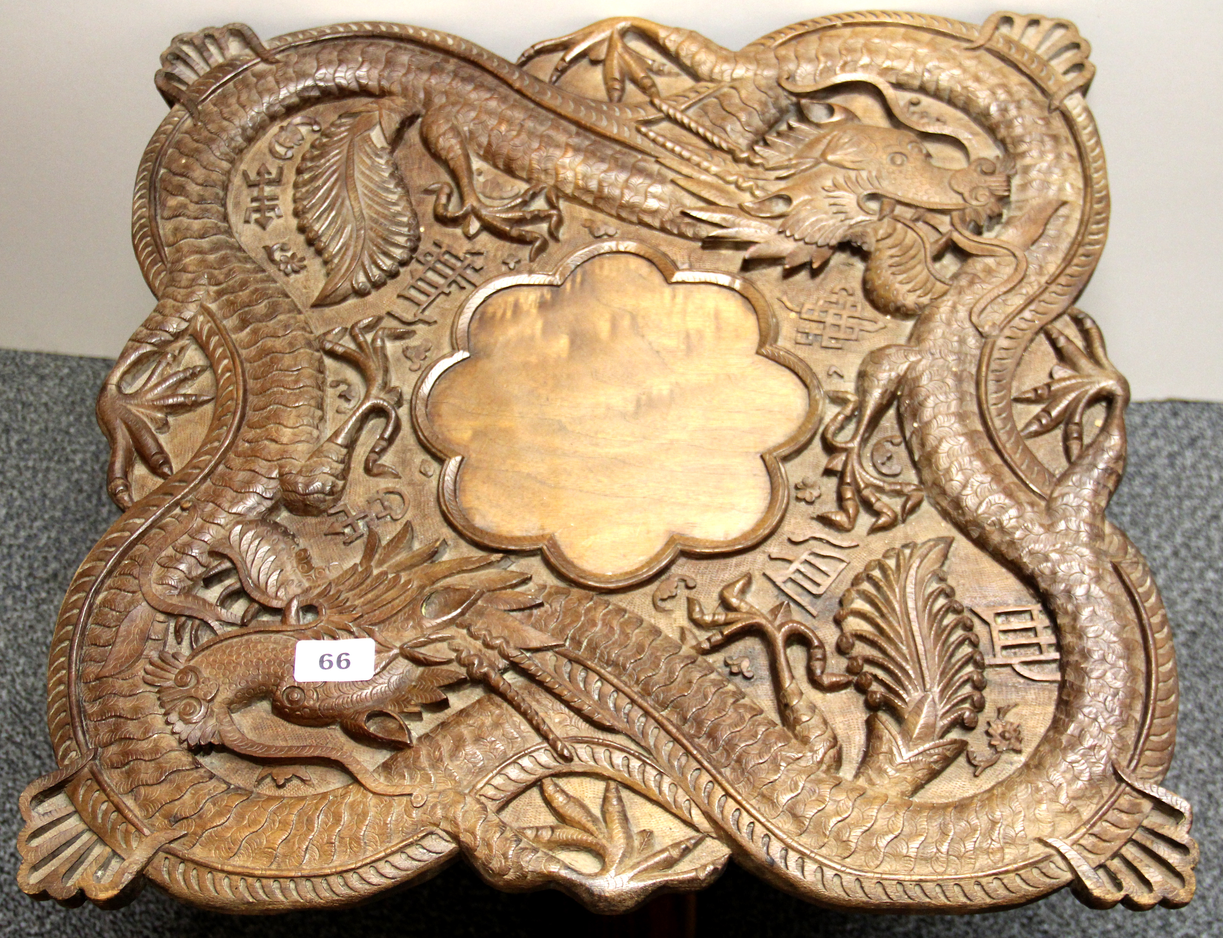 A mid 20th century Straits Chinese carved hardwood dragon table on a ...