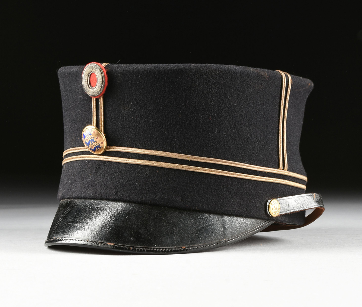 A GROUP OF THREE CONTINENTAL MILITARY HATS, CIRCA 1940-1960, comprising ...