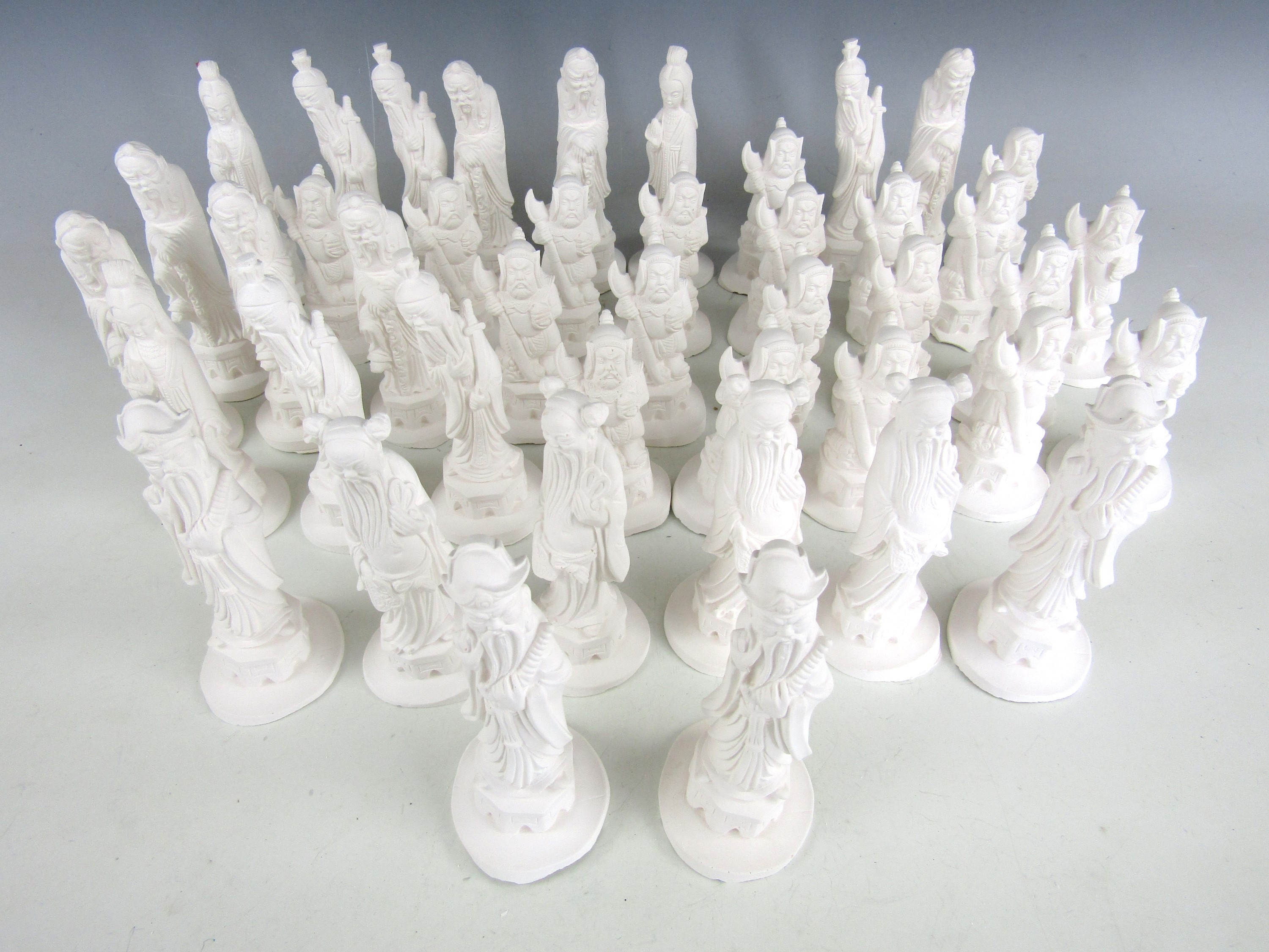 A set of contemporary plaster of Paris chess pieces