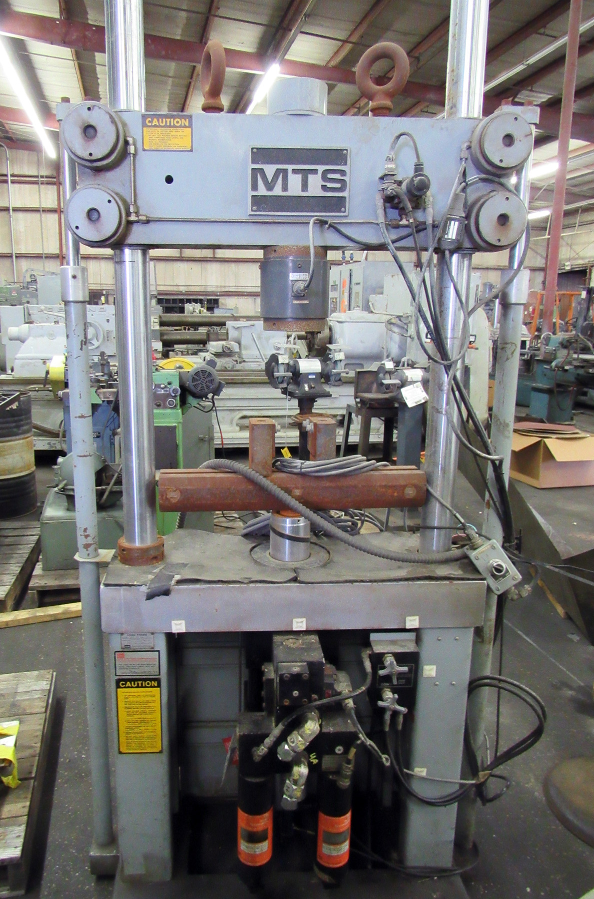 MTS Model 312-31 Fatigue Testing Machine, 250 kN (55 kips) cap., 3" col ...