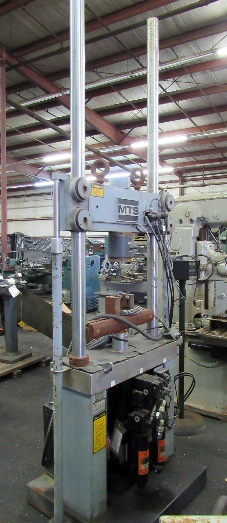 MTS Model 312-31 Fatigue Testing Machine, 250 kN (55 kips) cap., 3" col ...