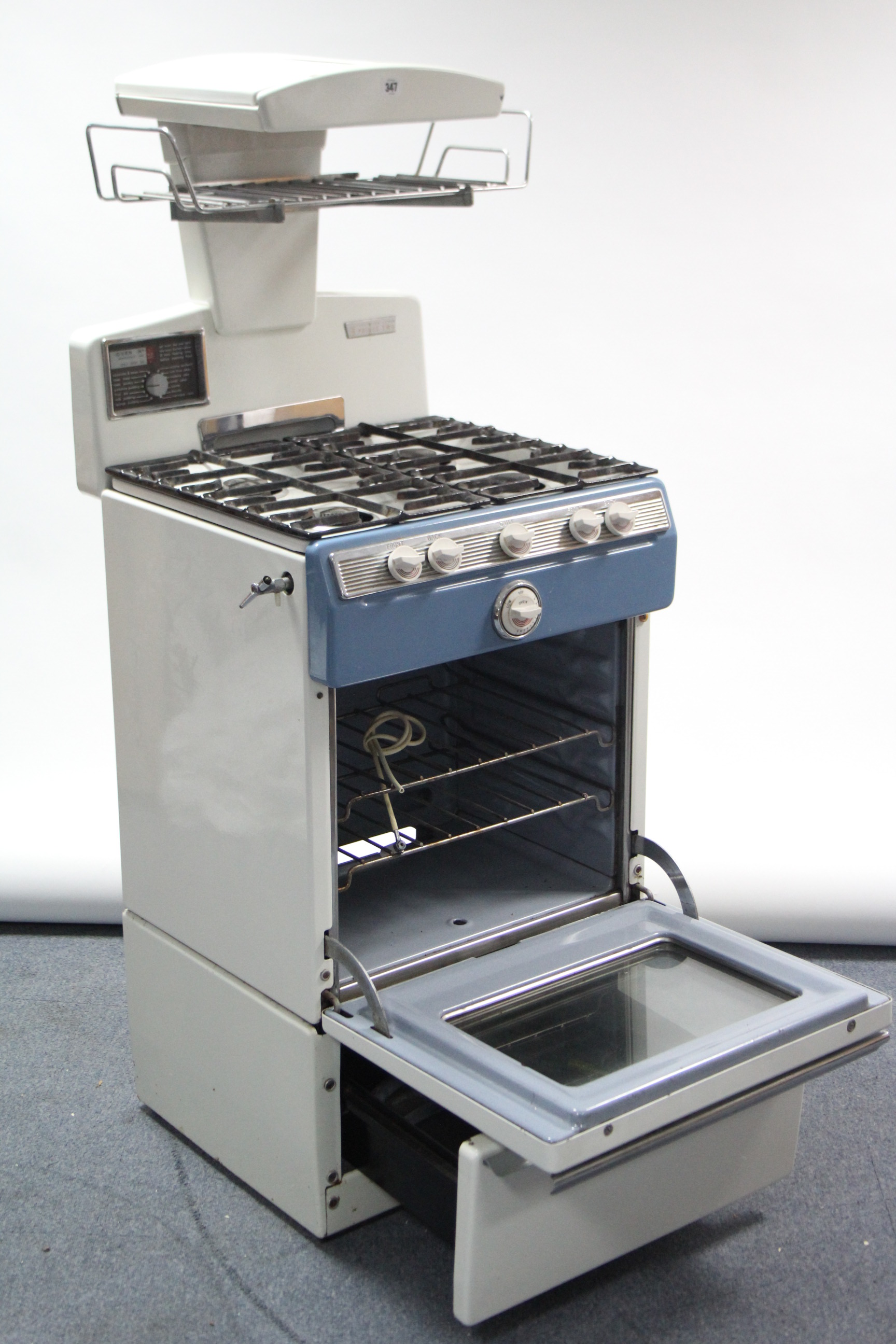 A 1960’s Parkinson Cowan “Prince Two” gas cooker in white & blue finish ...
