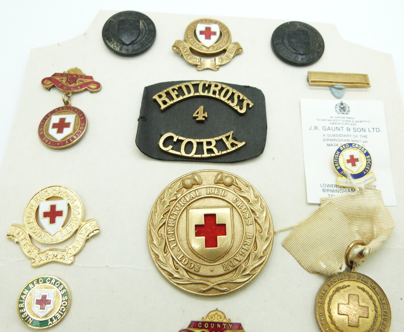 A carded collection eighteen of Red Cross badges including County of ...