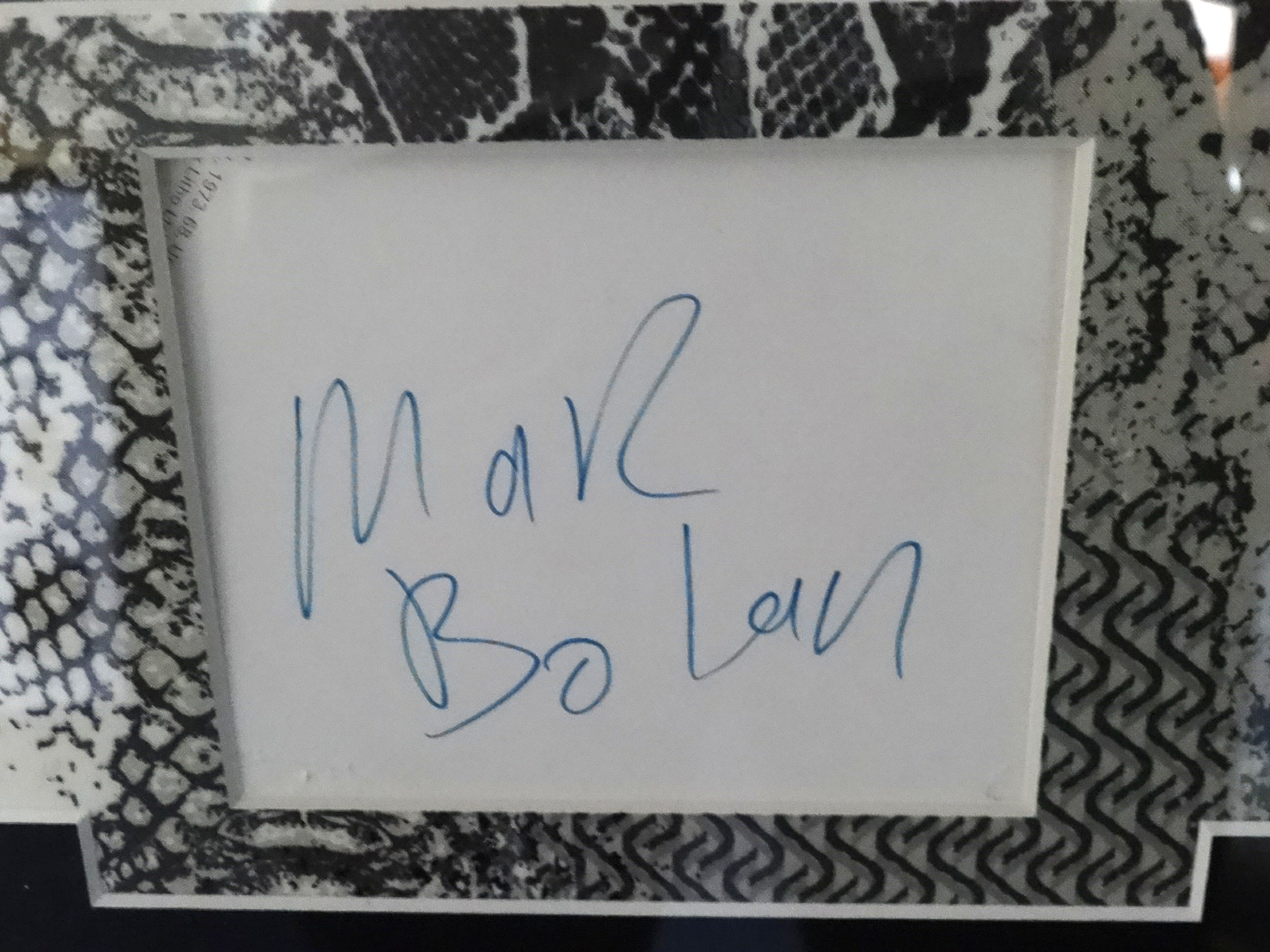 Marc Bolan, signature, set within a montage of a print and a record ...