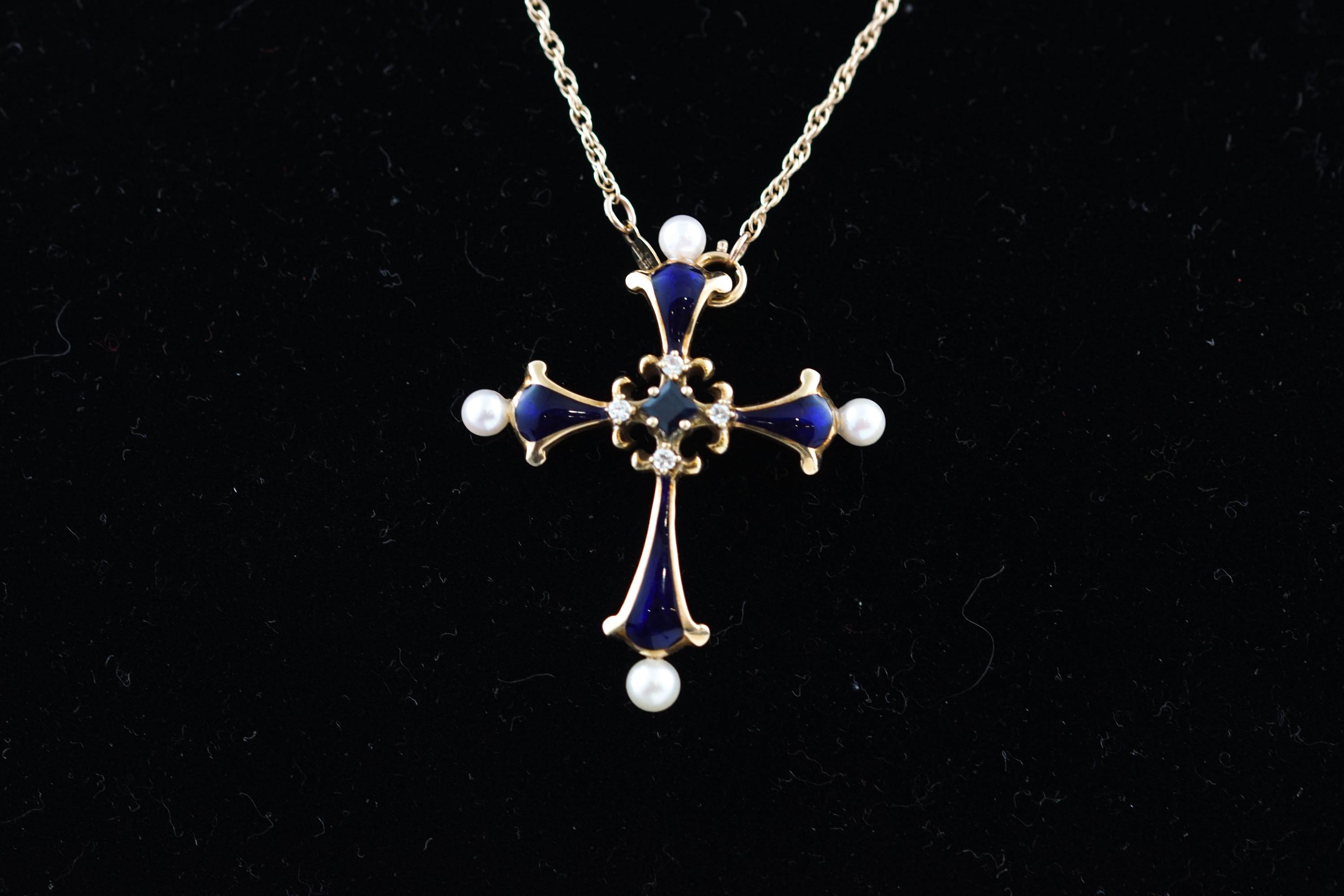 The Midnight Sapphire 14K Cross by Igor Carl Faberge, an enamel and gem ...