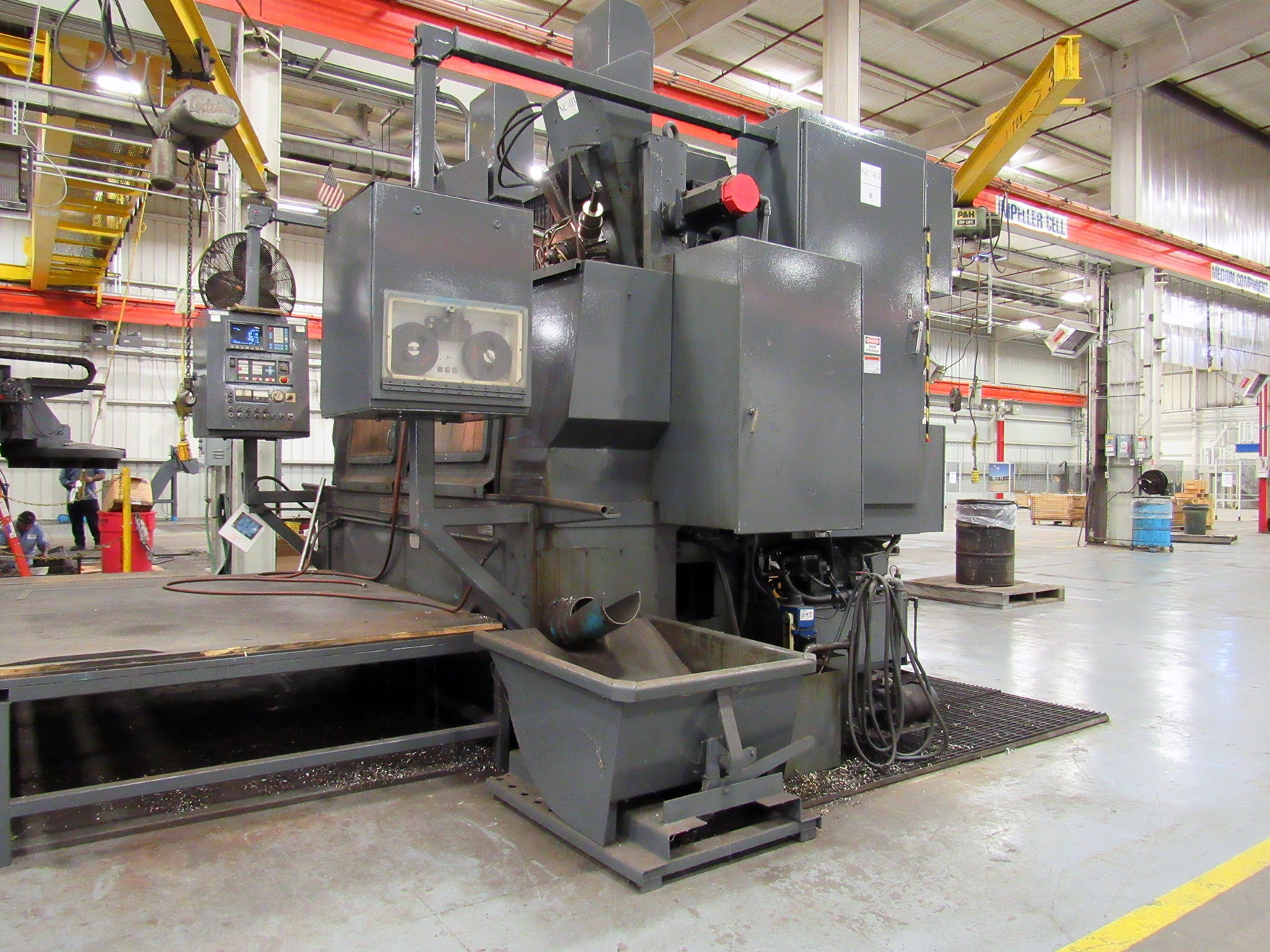 Motch Twin Spindle CNC VTL with left and right 30" chuck spindles, each ...