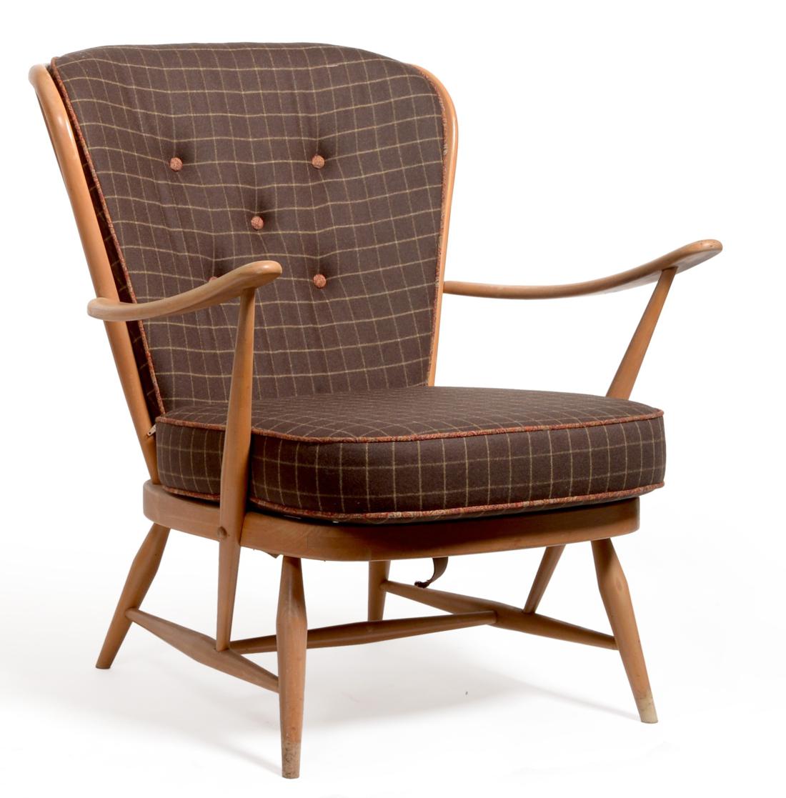 A 1960's Ercol 477 Easy Chair, designed by Lucian R Ercolani, beech ...