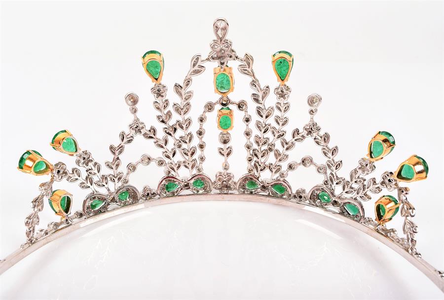 A fine diamond and emerald tiara of contemporary design, set with ...
