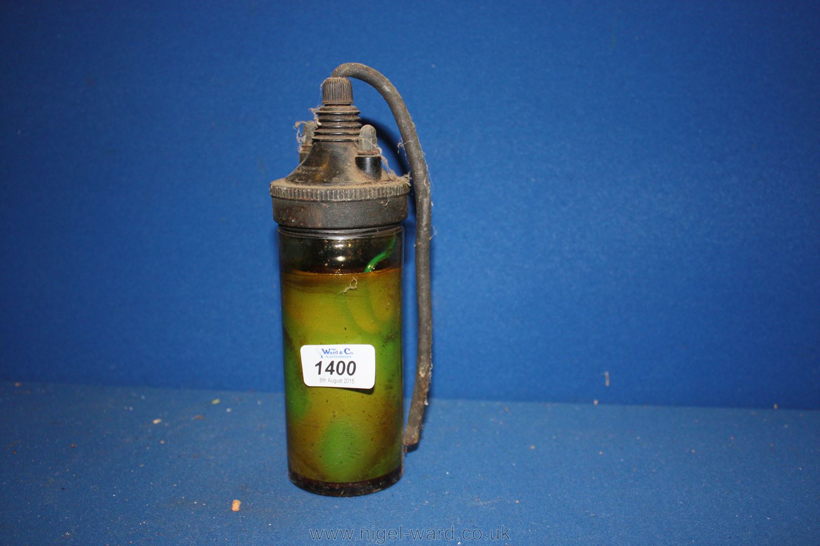 An early ''Runbaken, Manchester Oil Coil'' having a glass base and for ...