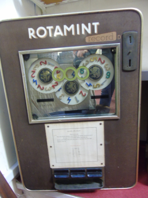 VINTAGE WALL HUNG ROTAMINT RECORD GAMING MACHINE