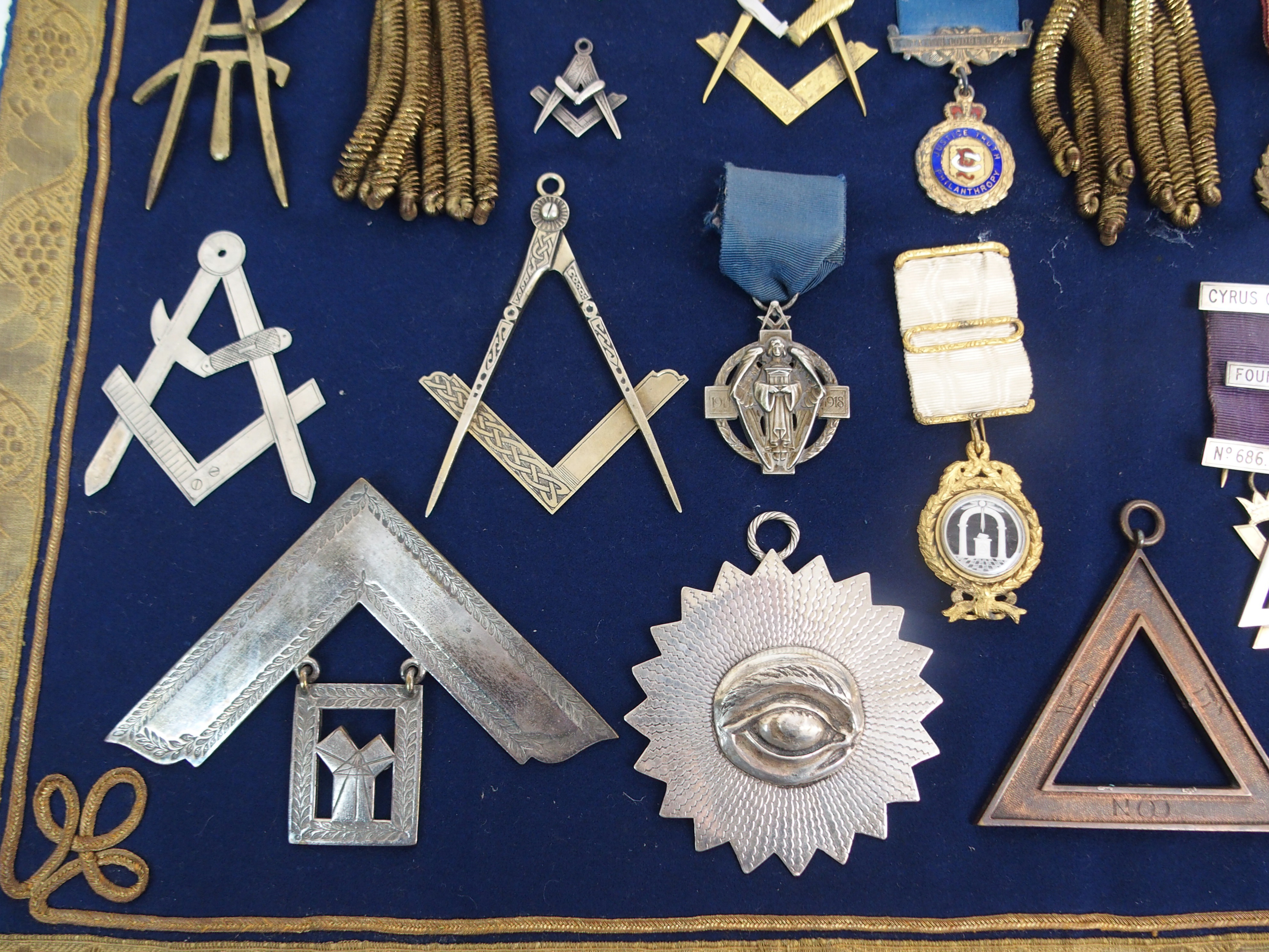 A QUANTITY OF MASONIC MEDALS AND BADGES including the All-Seeing Eye ...
