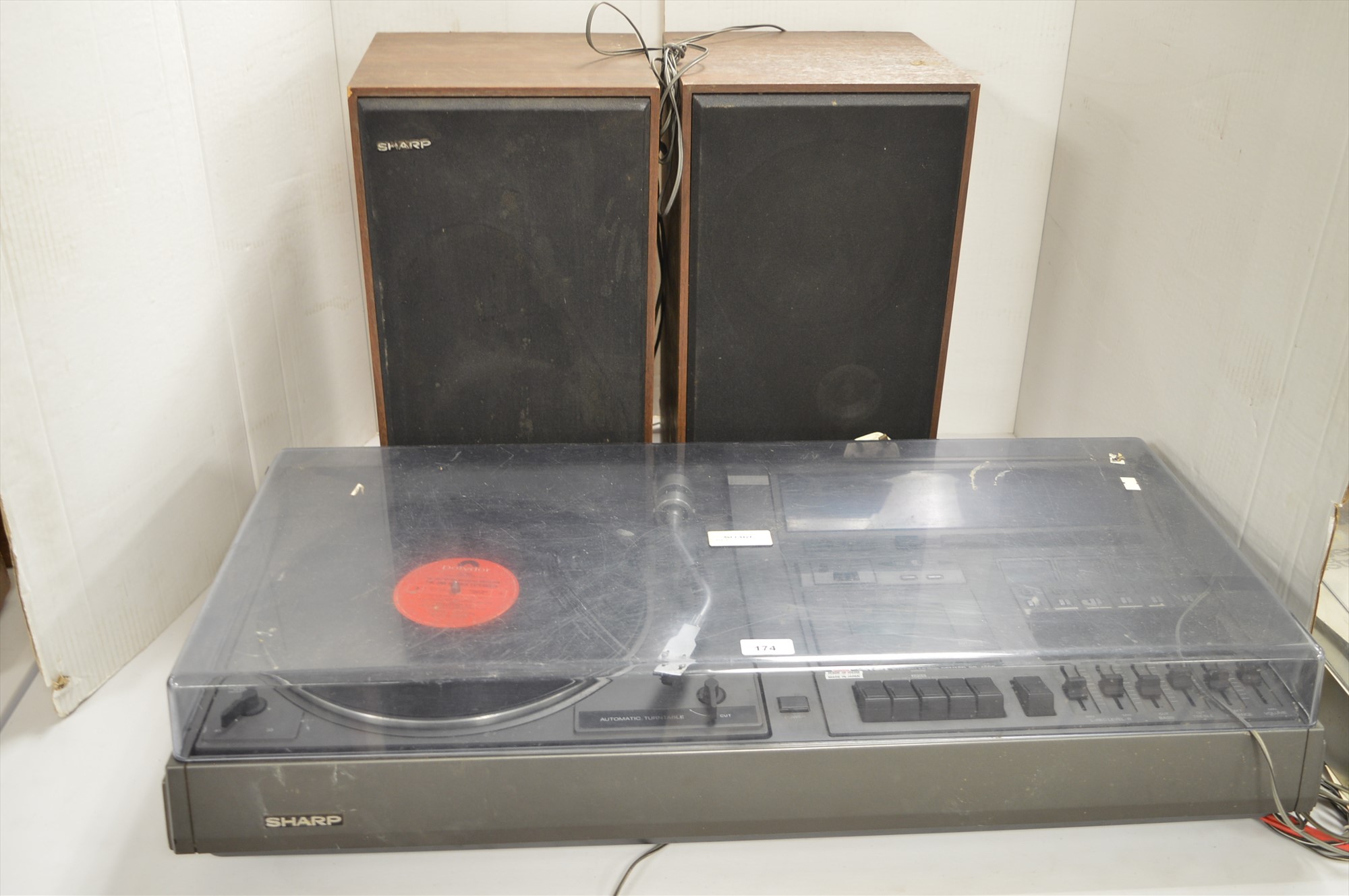 A Sharp SG-450E Stereo Music system with automatic turntable and tape ...