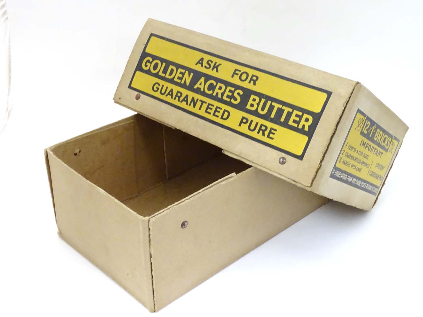 A cardboard butter packing box marked ' Dominion Dairy Co. Ltd. Golden ...