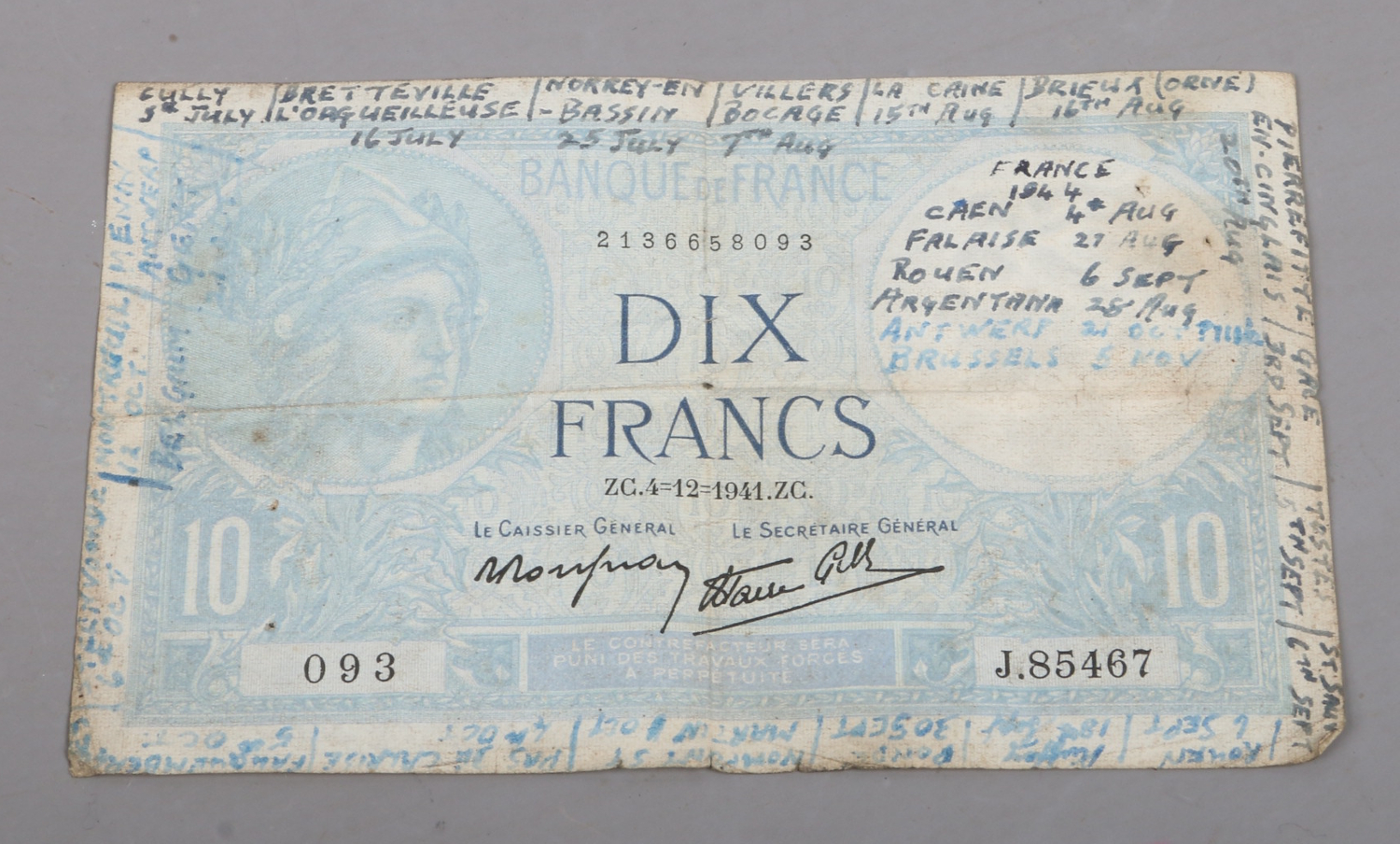 A French Ten (Dix) Francs bank note. Penned with French place names and ...