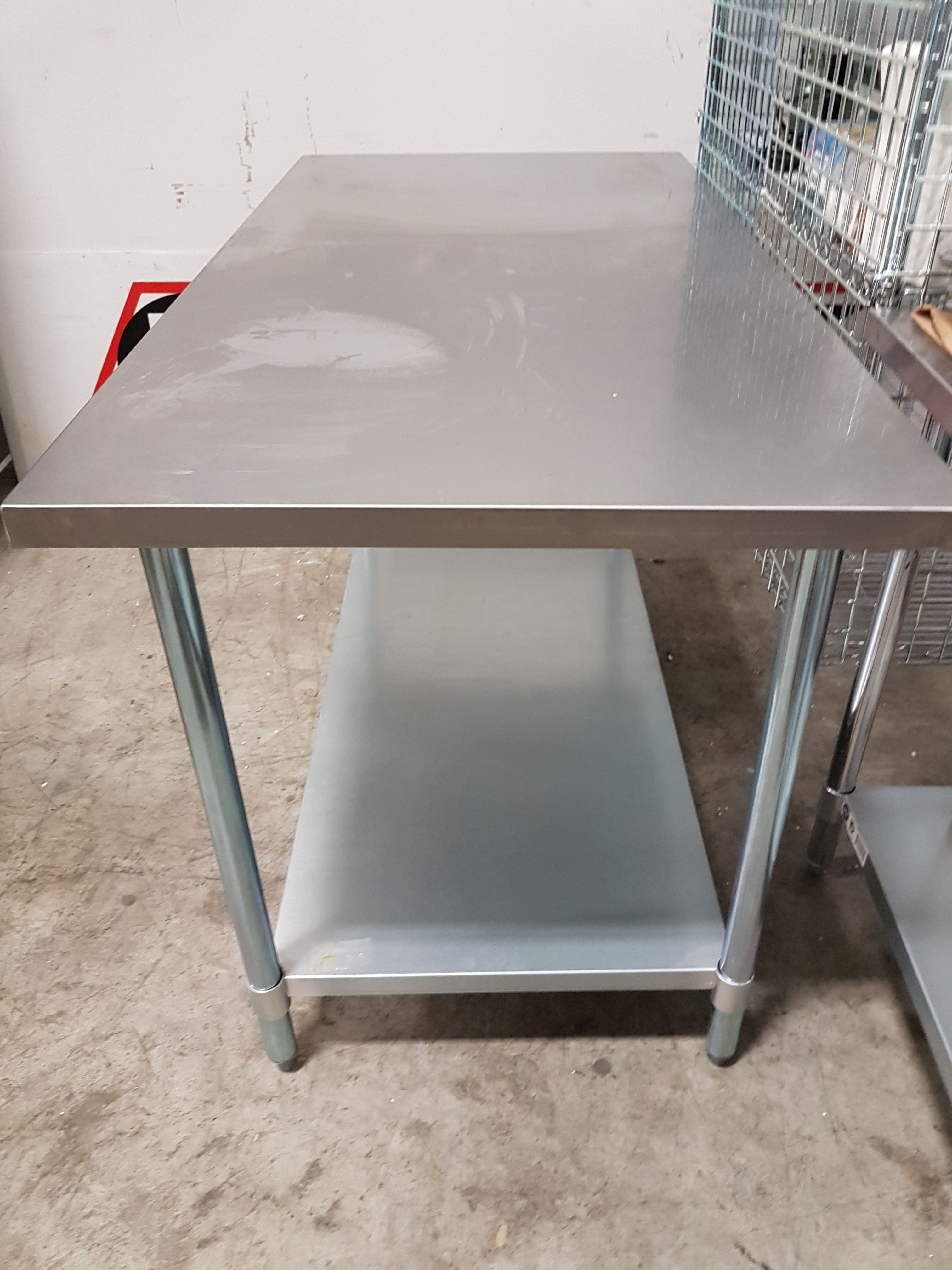 30" x 60" Stainless Work Table with Galvanized Under Shelf, Floor Model