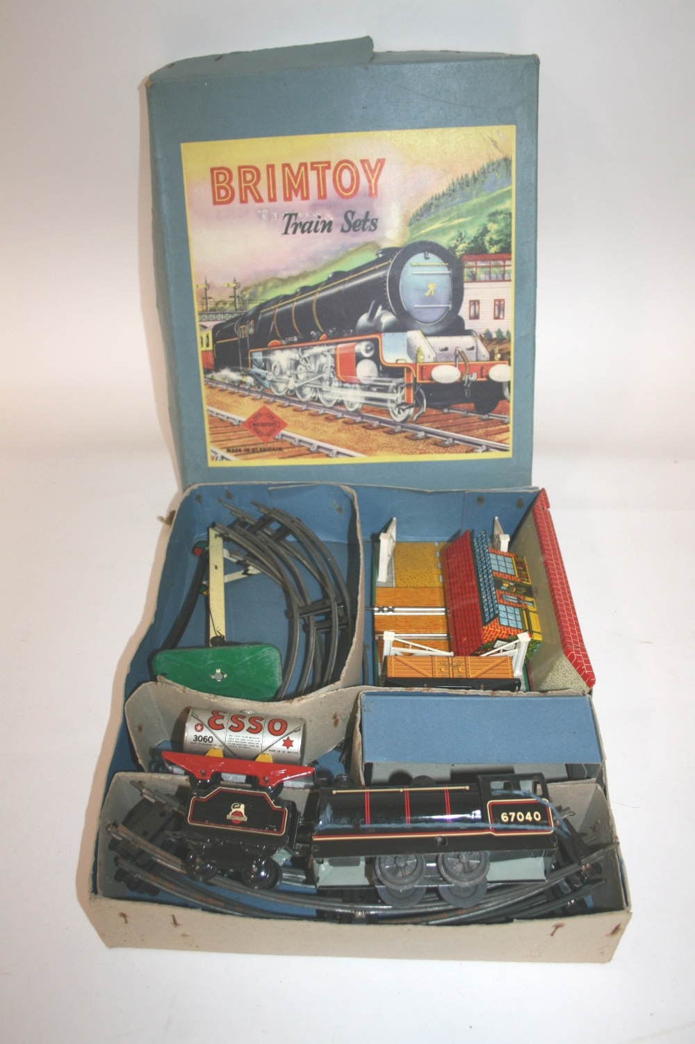 BRIMTOY BOXED TRAIN SET a clockwork train set including a locomotive ...