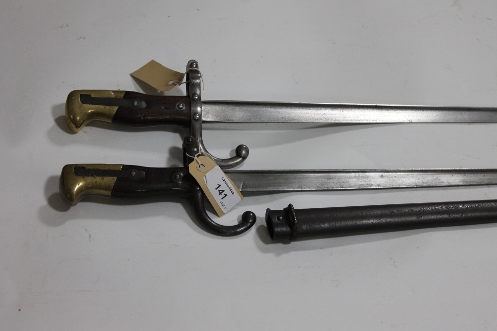 TWO FRENCH BAYONETS. An M1874 pattern French bayonet, St Etienne ...