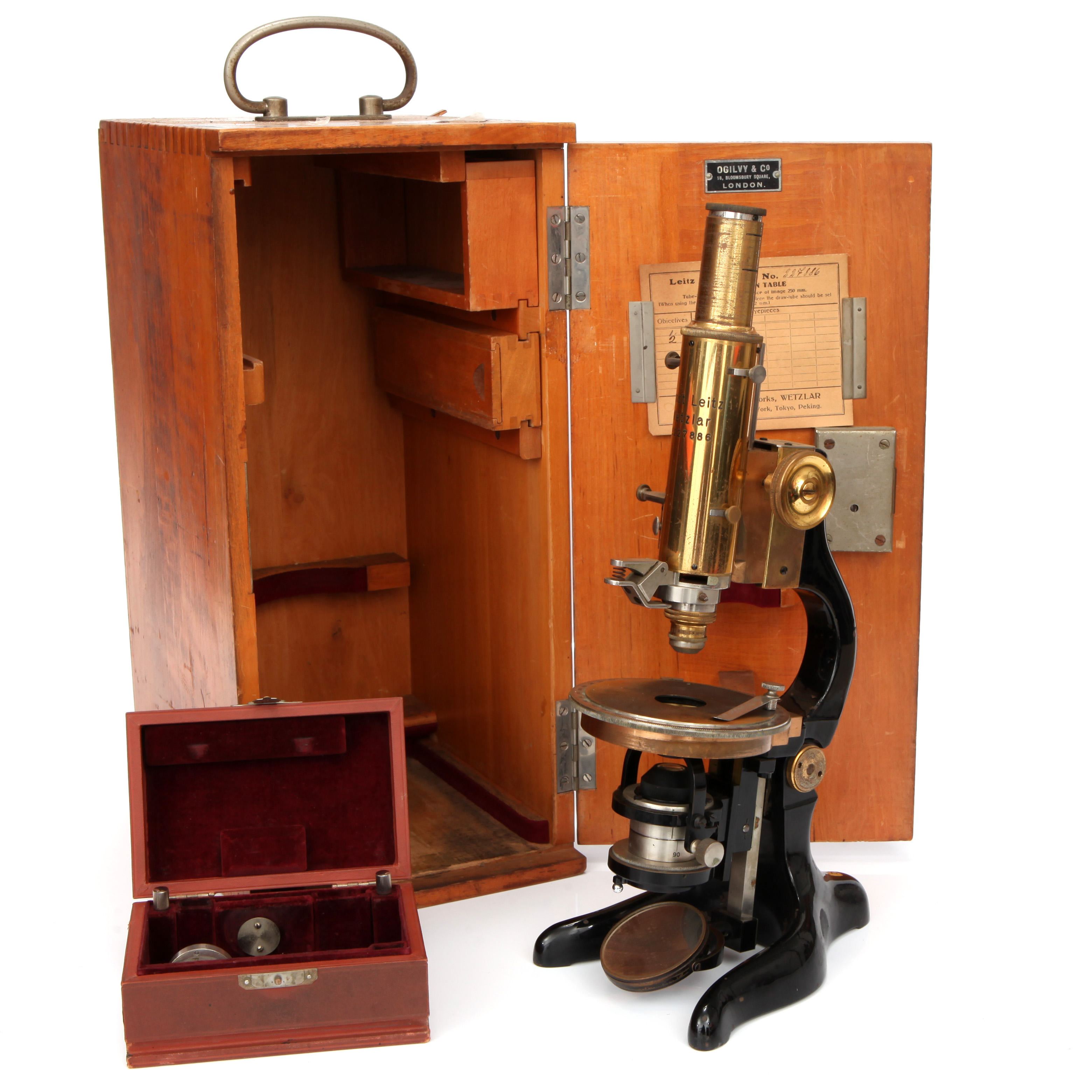 A Leitz Polarizing Microscope, with enamelled black limb and Y shaped ...