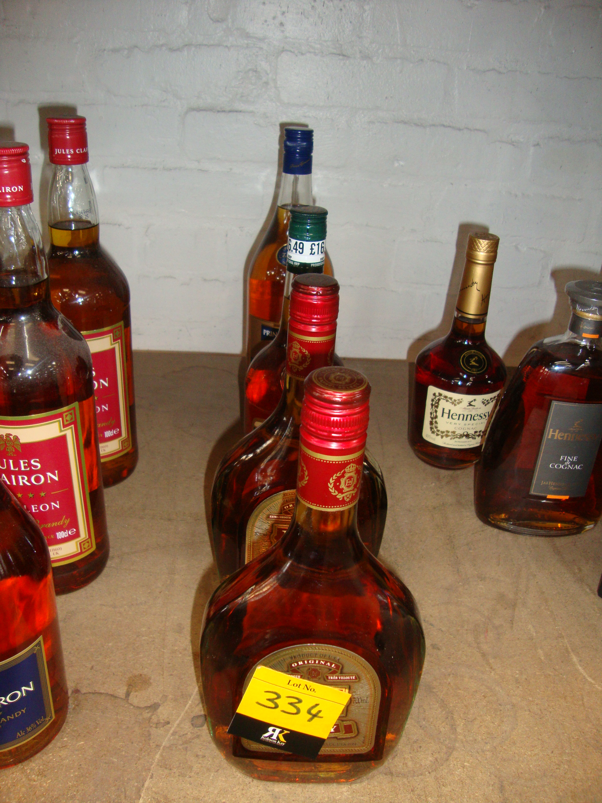 4 assorted bottles of Brandy by Three Barrels, Prince Consort and E&J