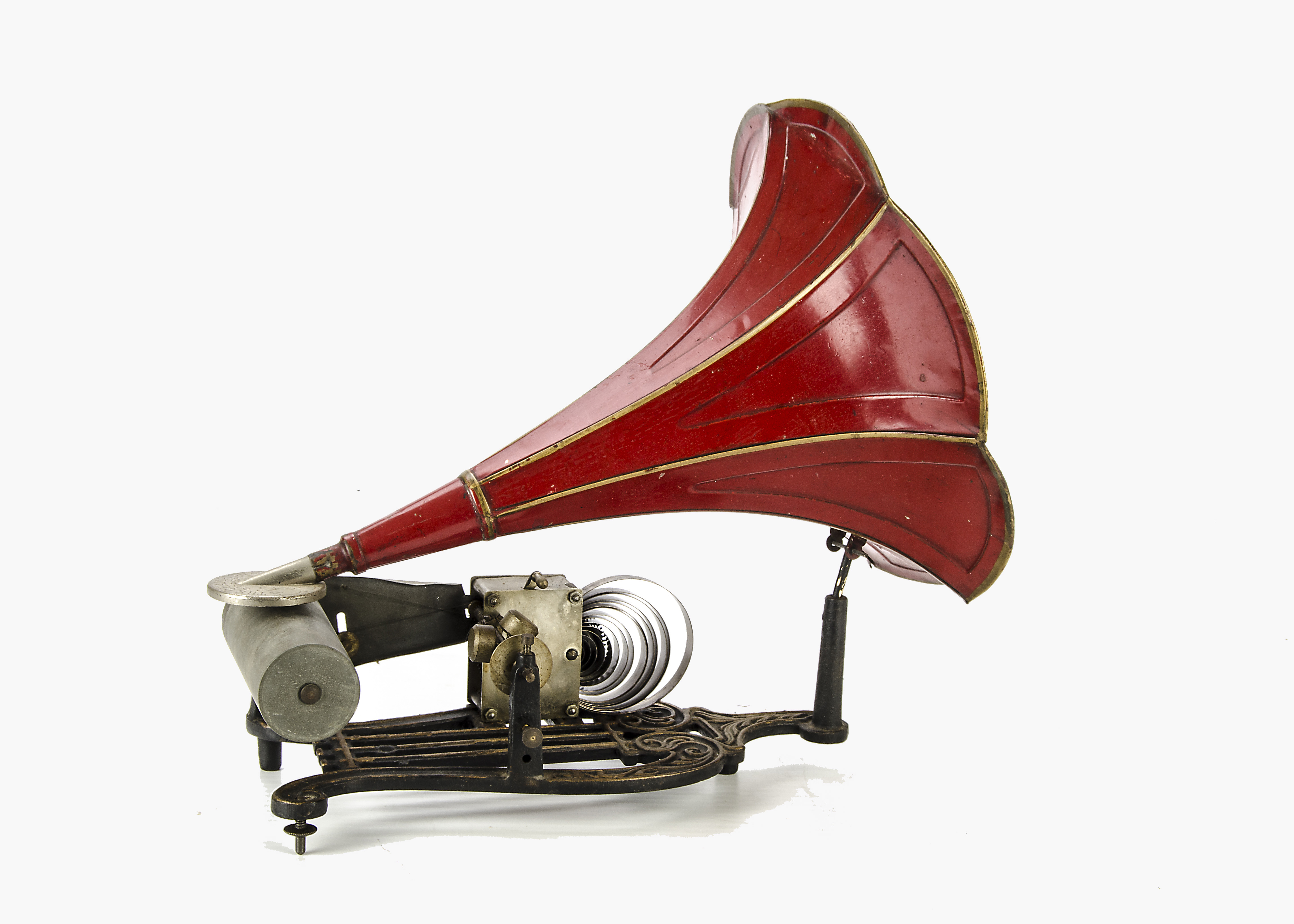 Phonograph: a Puck phonograph, with relief-cast lyre base and red ...