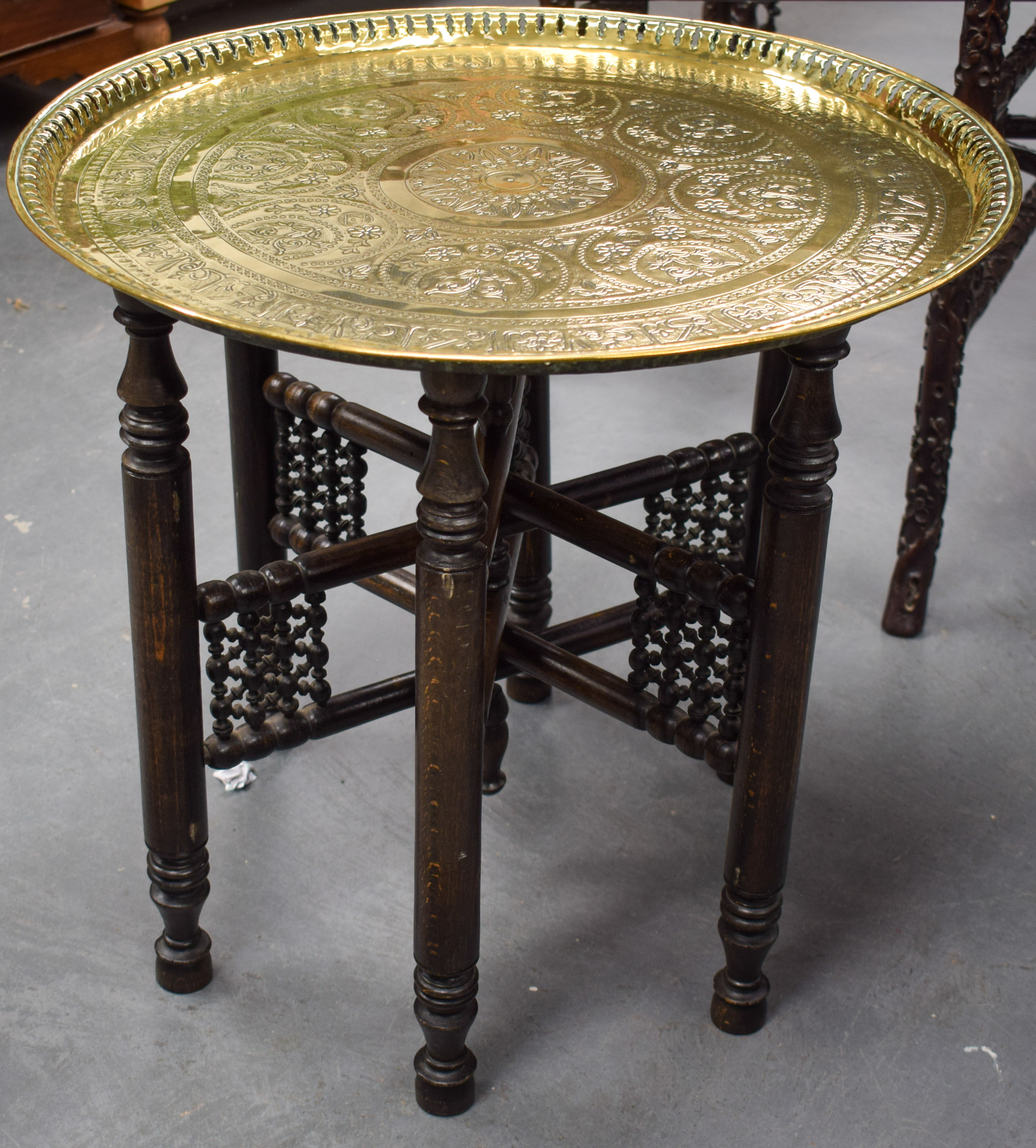 A SYRIAN MIDDLE EASTERN BRASS TOP TABLE decorated with foliage. 58 cm x ...