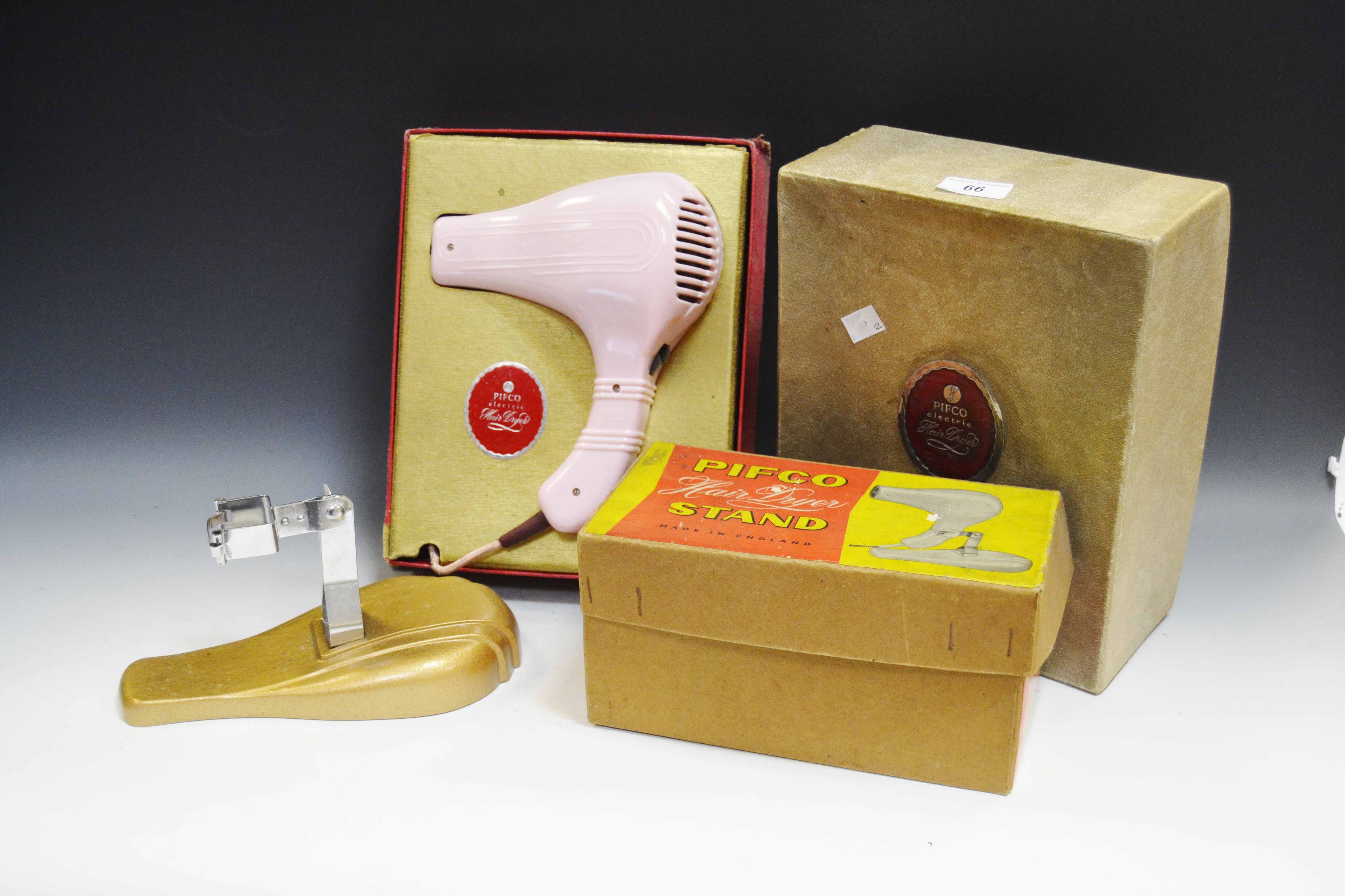A Pifco electric hair dryer, pink, boxed; a Pifco hair dryer stand (2)