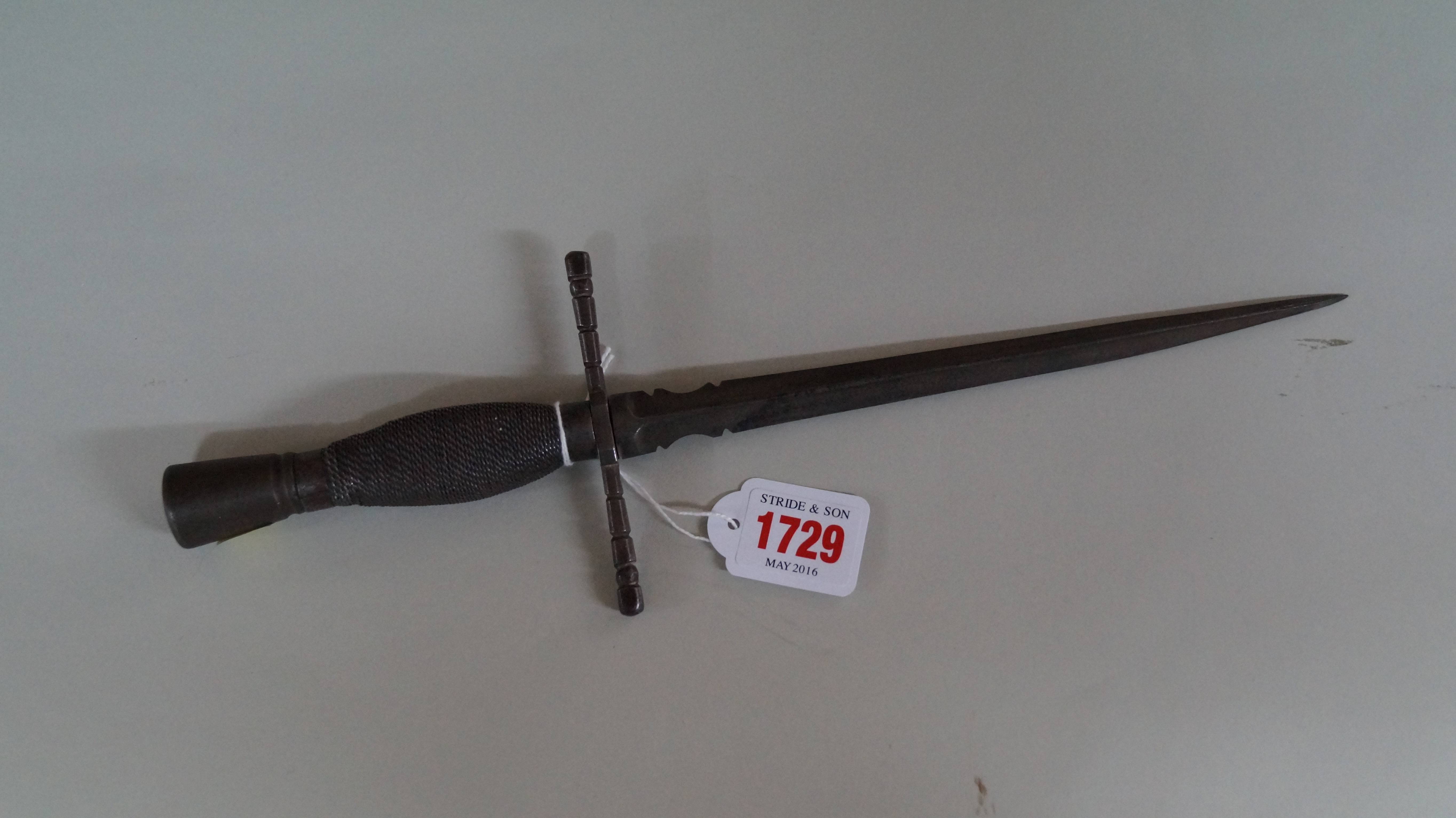 An antique French dagger, with triangular blade.