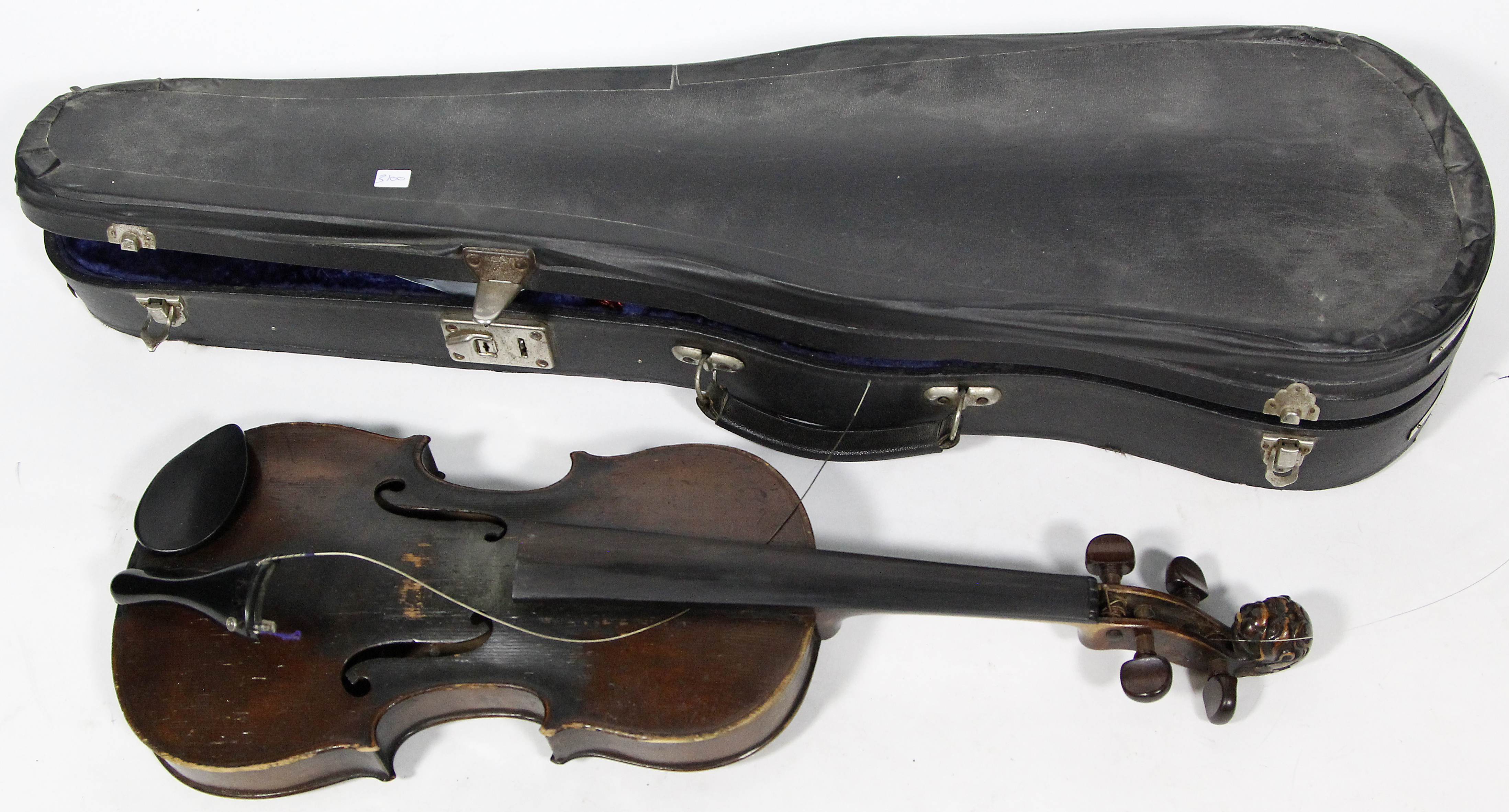 A late 19th/early 20th Century Bavarian violin having carved lion head ...