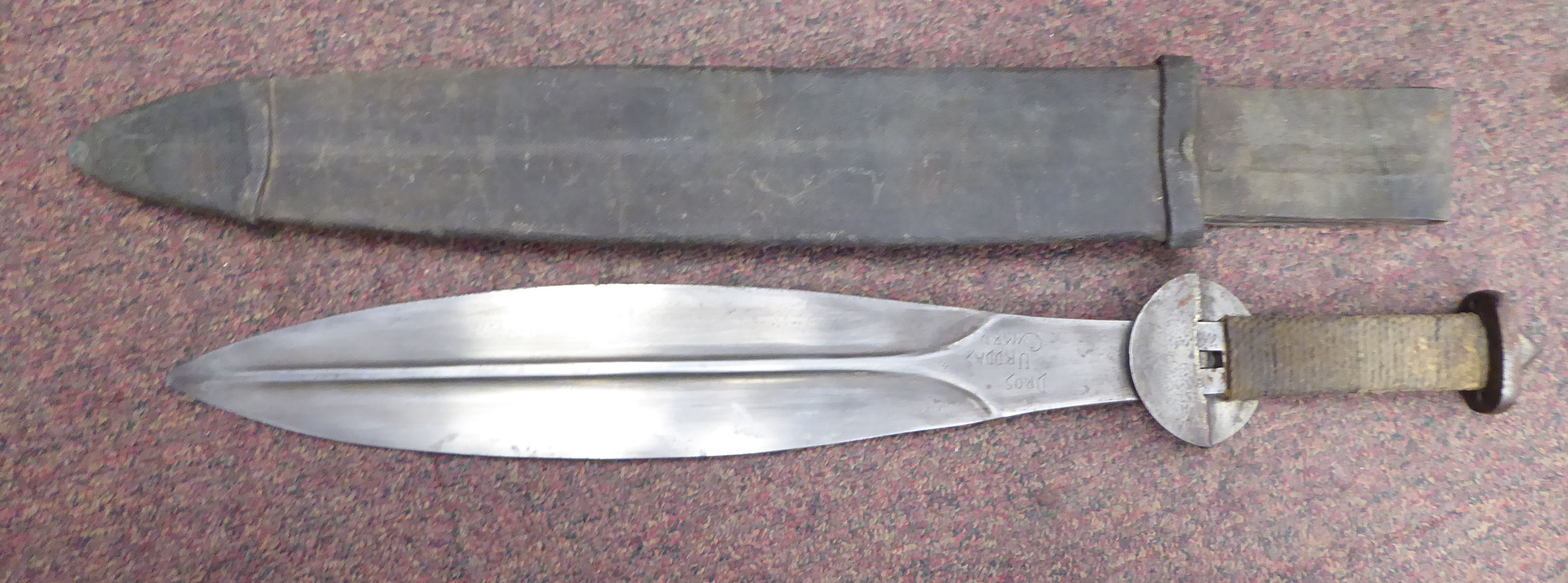 A Great War Welsh machine gunner's trench sword with a cord bound ...