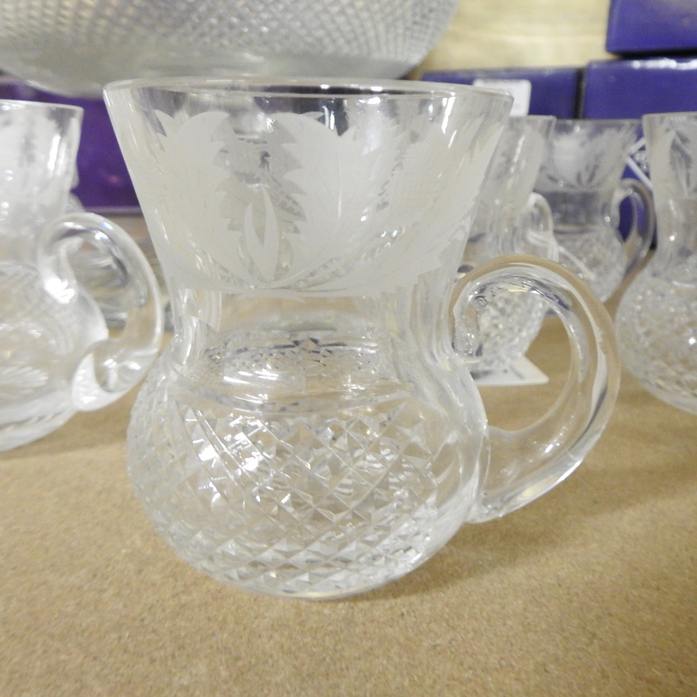 An Edinburgh crystal thistle pattern punch bowl, 28cm high, together ...