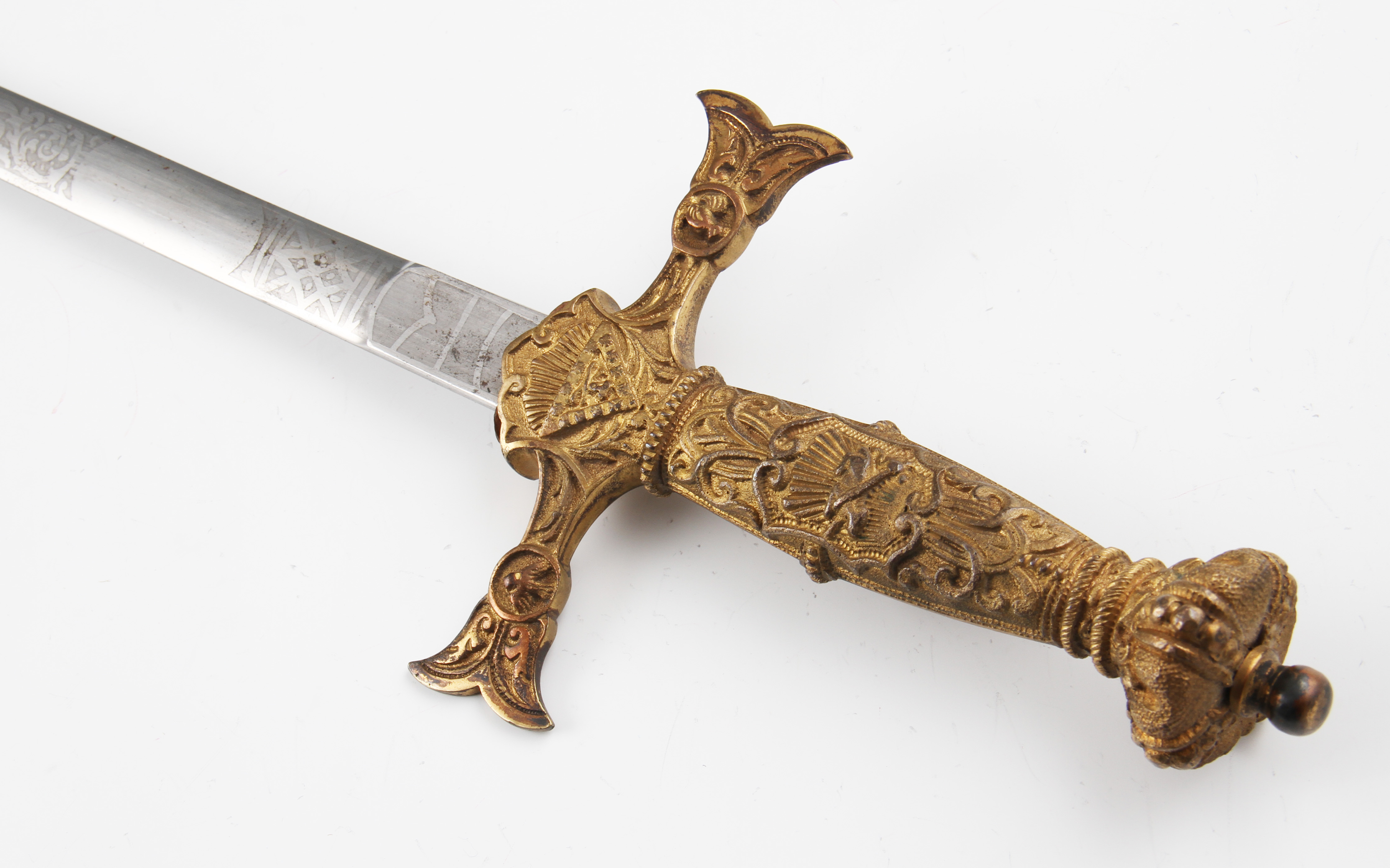 A dress sword with brass hilt with skull and cross bones, in triangle ...