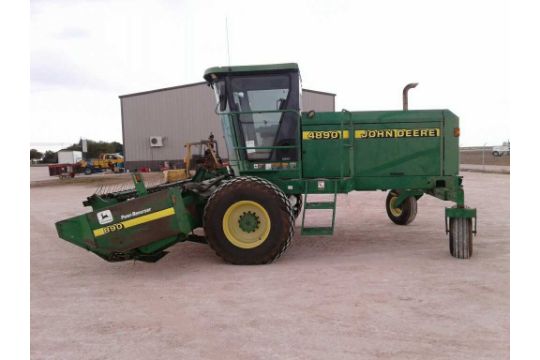 John Deere 4890 Swather with an 890 power reverse hay header, Shows ...