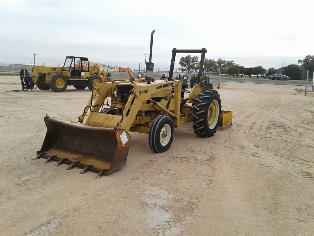 Ford 340A Tractor with front end loader & Servis Equipment LT66 box ...
