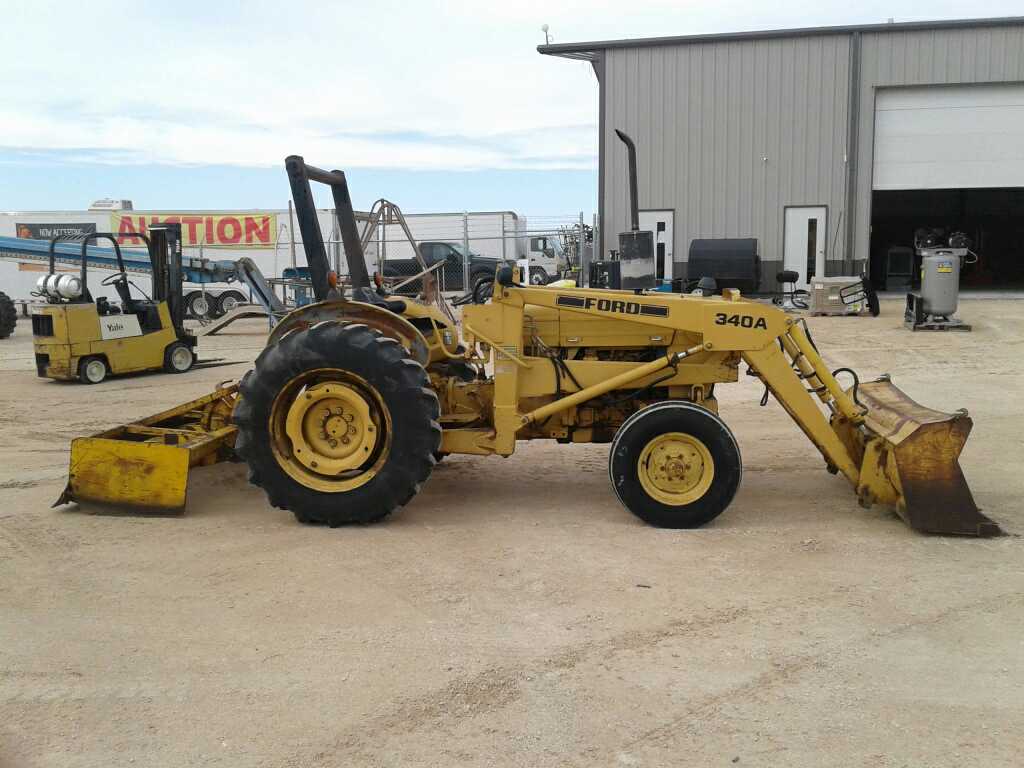 Ford 340A Tractor with front end loader & Servis Equipment LT66 box ...