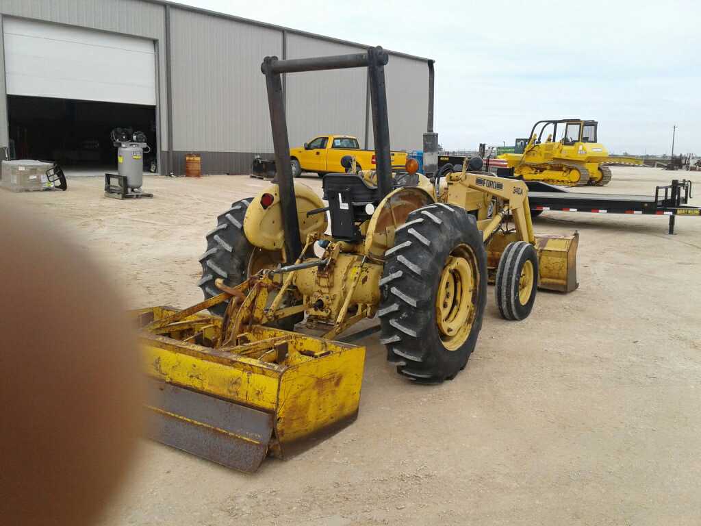 Ford 340A Tractor with front end loader & Servis Equipment LT66 box ...