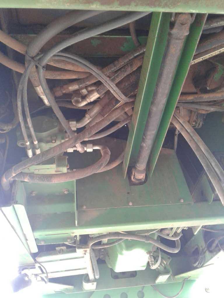 John Deere 4890 Swather with an 890 power reverse hay header, Shows ...