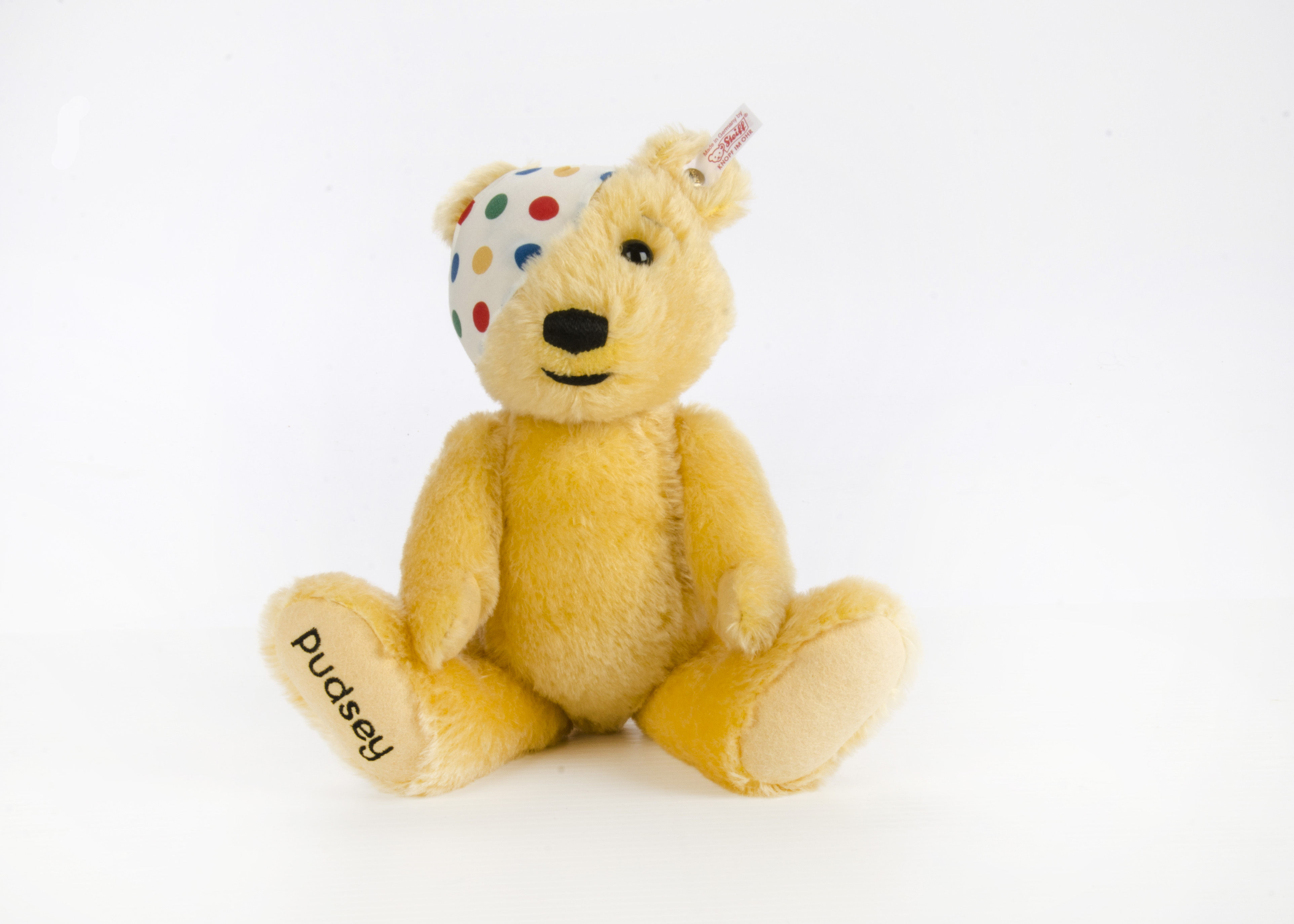 A Steiff BBC Children in Need ' Pudsey' Teddy Bear, in light gold with ...