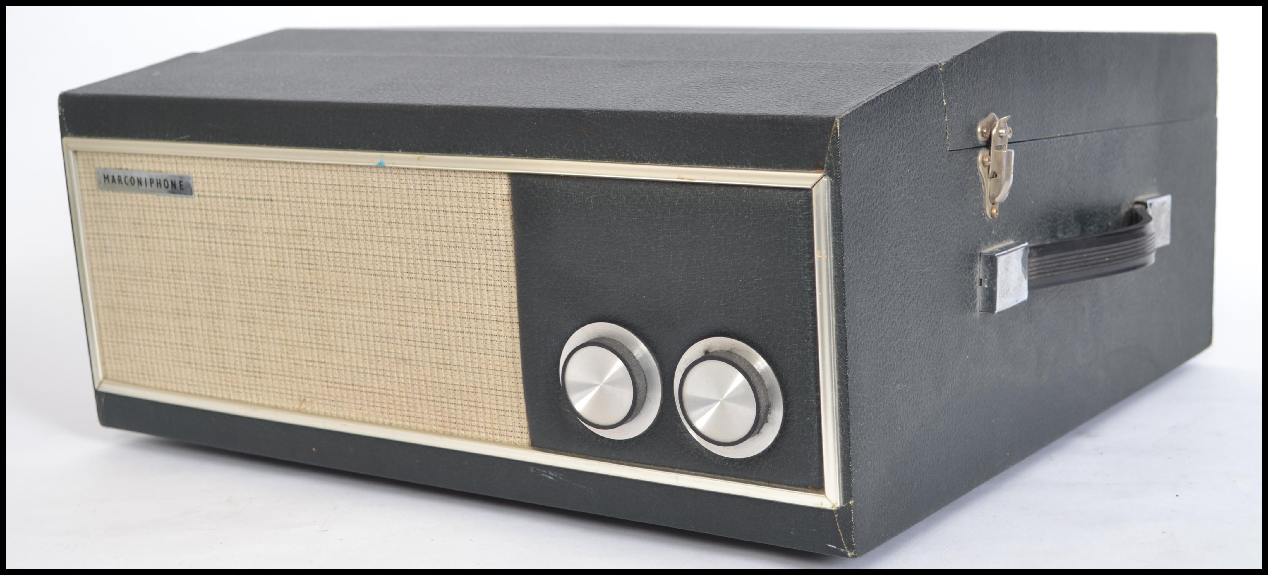 A vintage 1950's two tone portable record player by Marconiphone having ...