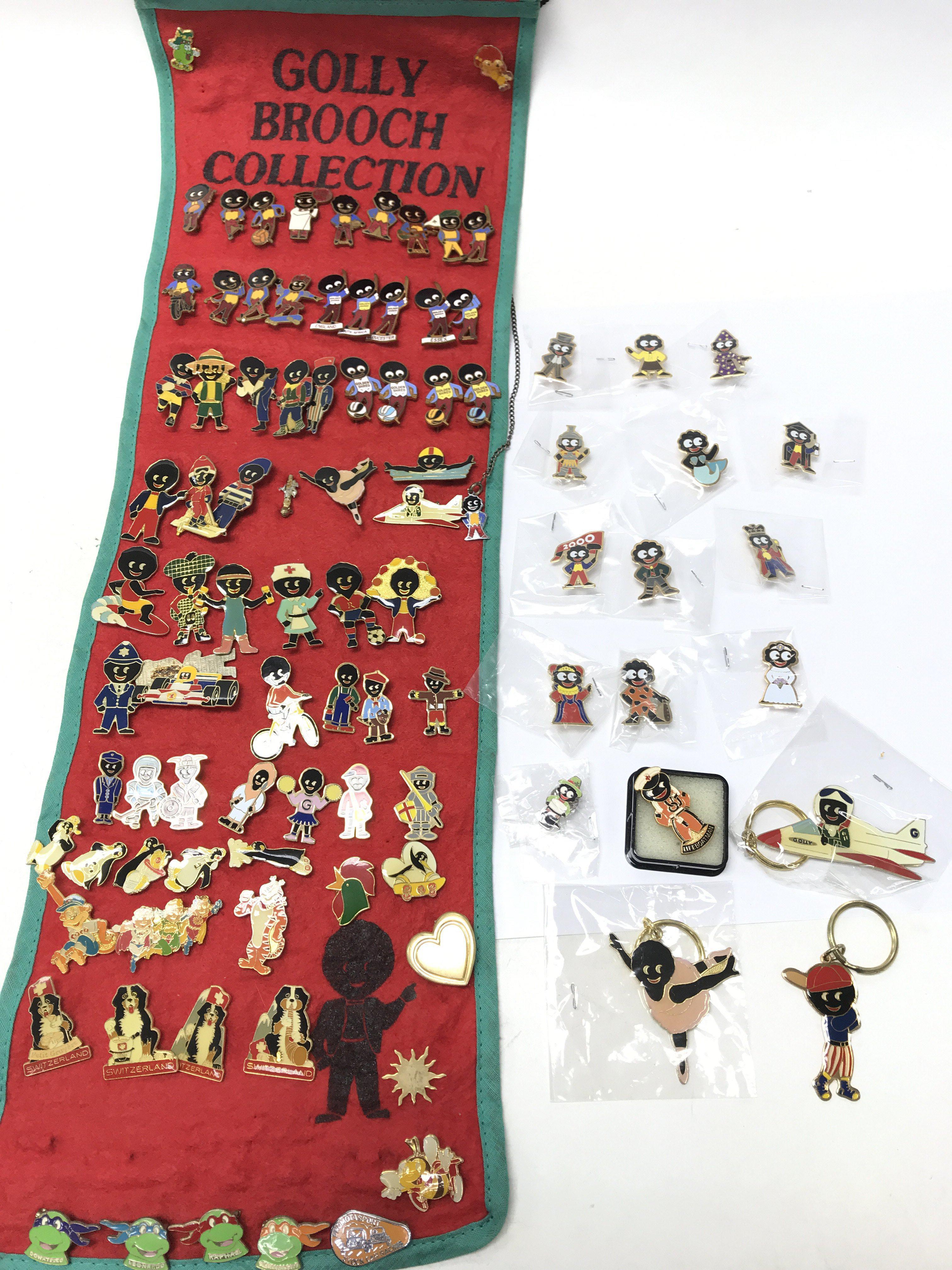 A large collection of Robertson's Golly badges and associated ...