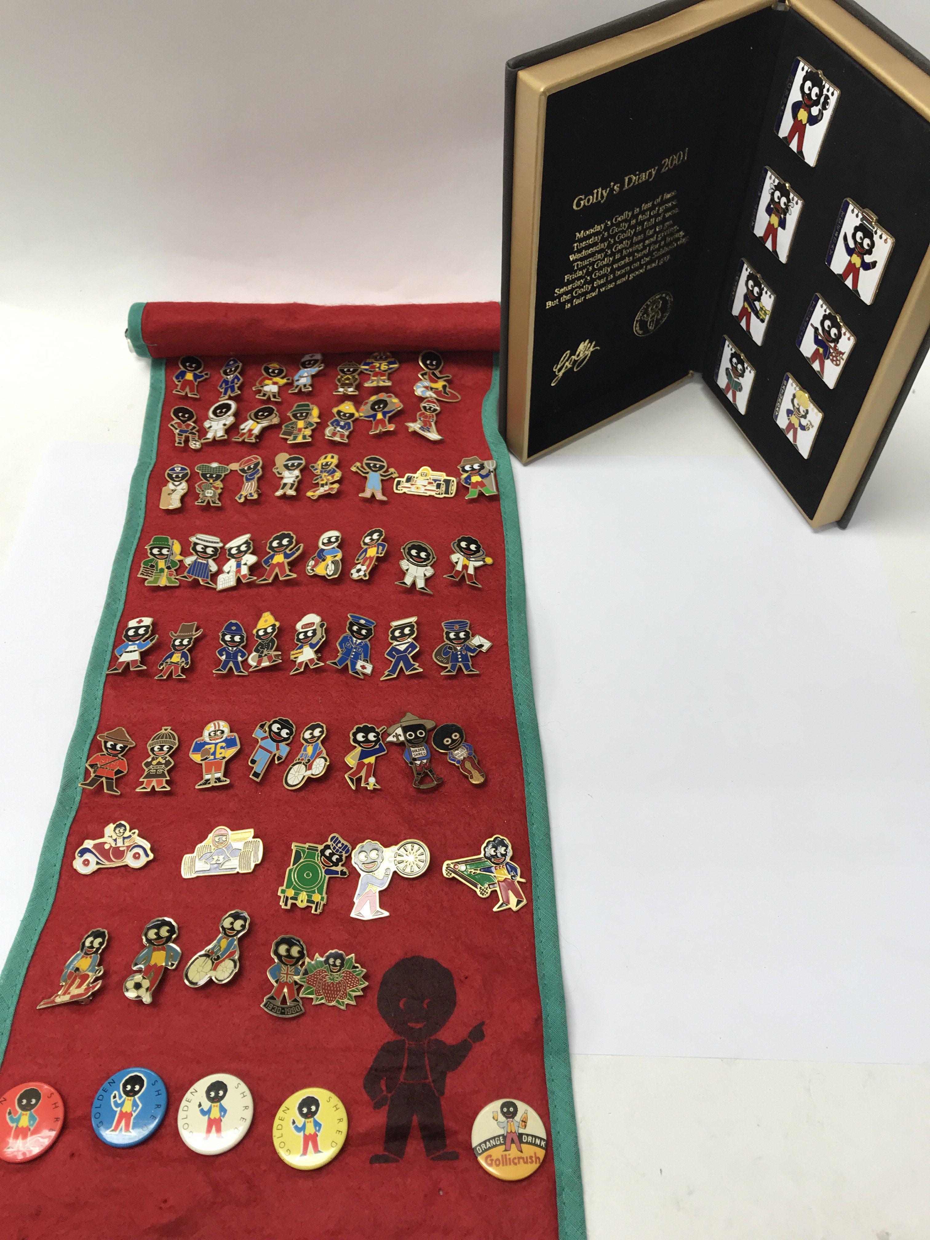 A large collection of Robertson's Golly badges and associated ...