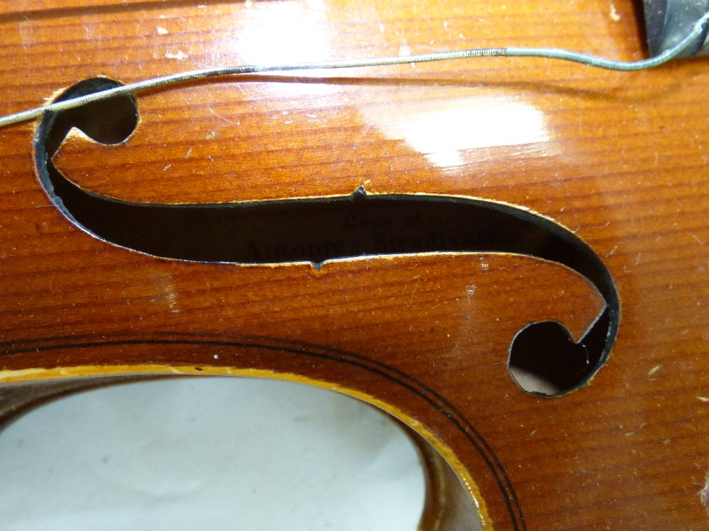 CASED VIOLIN, LABEL READS 'COPY OF AN ANTONIO STRADIVARIUS'