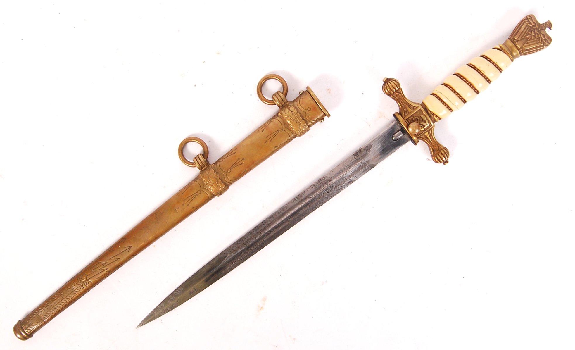 A WWII Second World War German Kriegsmarine Navy dagger. With engraved ...